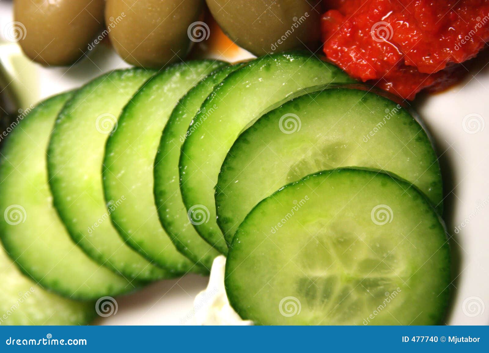 Sliced cucumber stock photo. Image of greek, olives, leaves - 477740