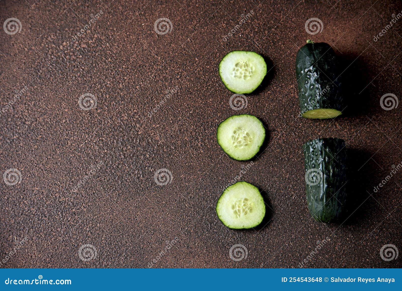 Sliced cucumber on a table stock photo. Image of nutrition - 254543648