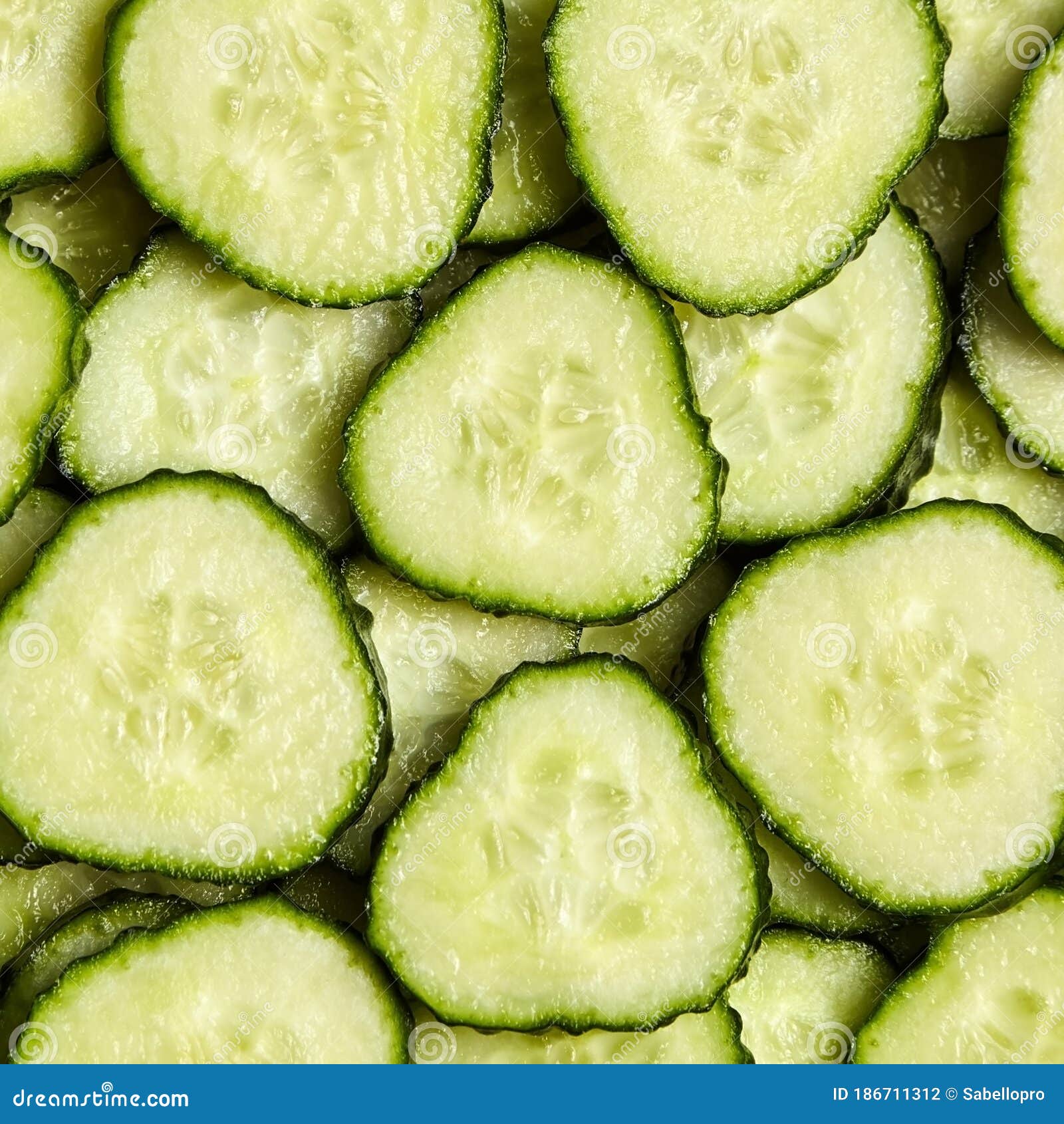 Sliced Gherkin. Fresh Slices of Cucumber As Background Stock Photo ...