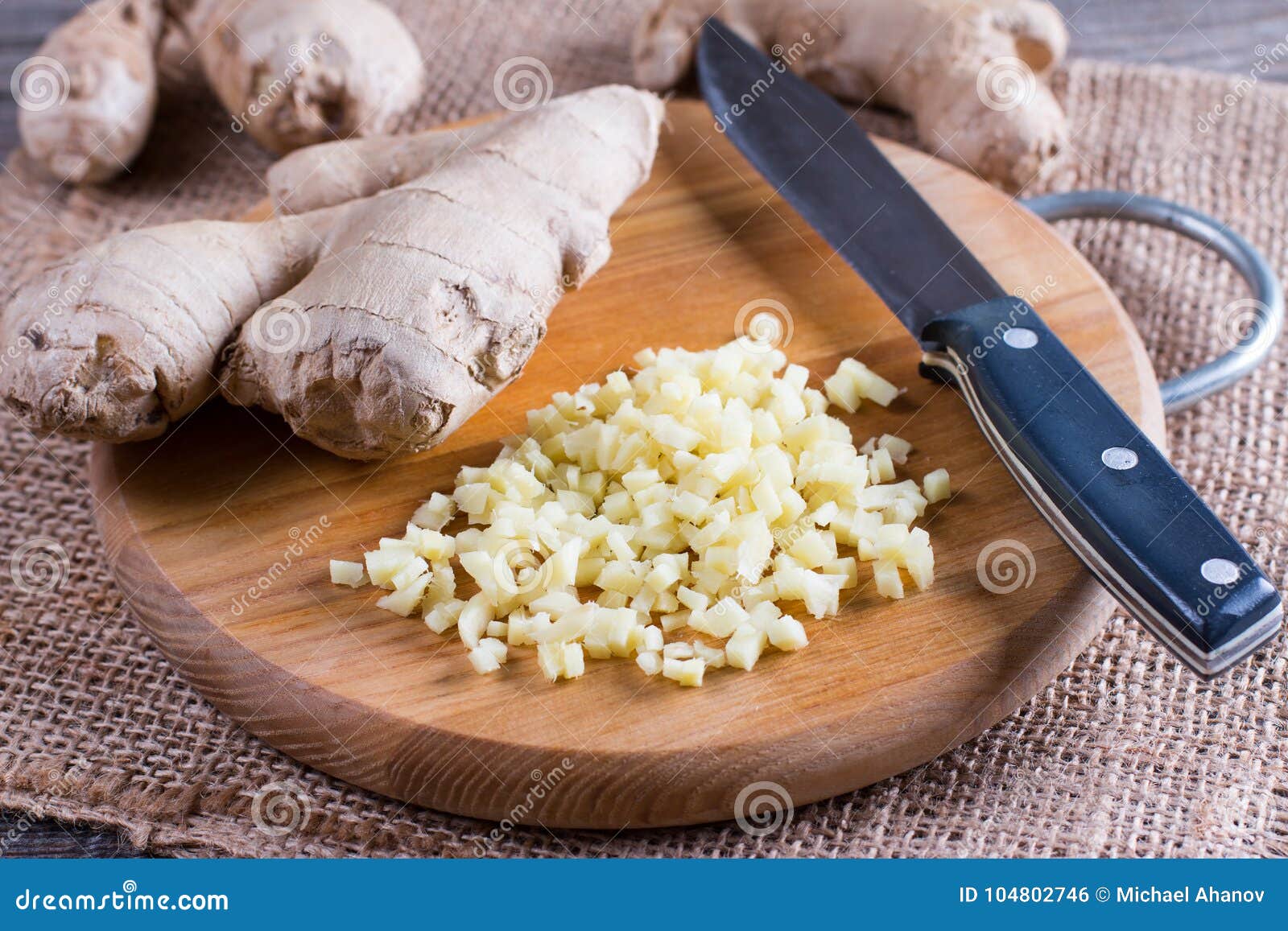 Sliced Ginger Root with a Knife on a Cutting Board Stock Photo - Image ...