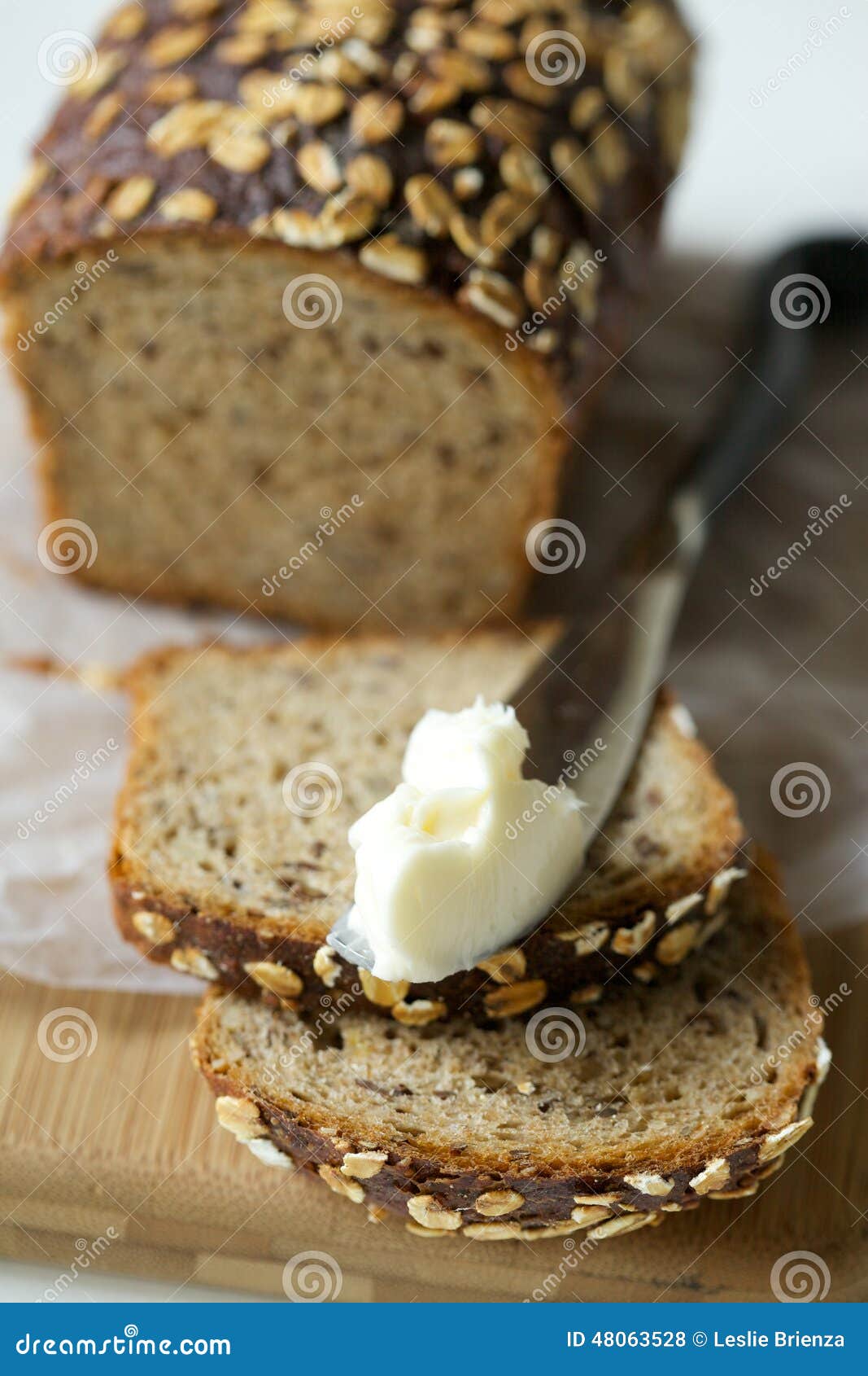 Sliced Grain Bread Front View with Butter Stock Photo - Image of life ...