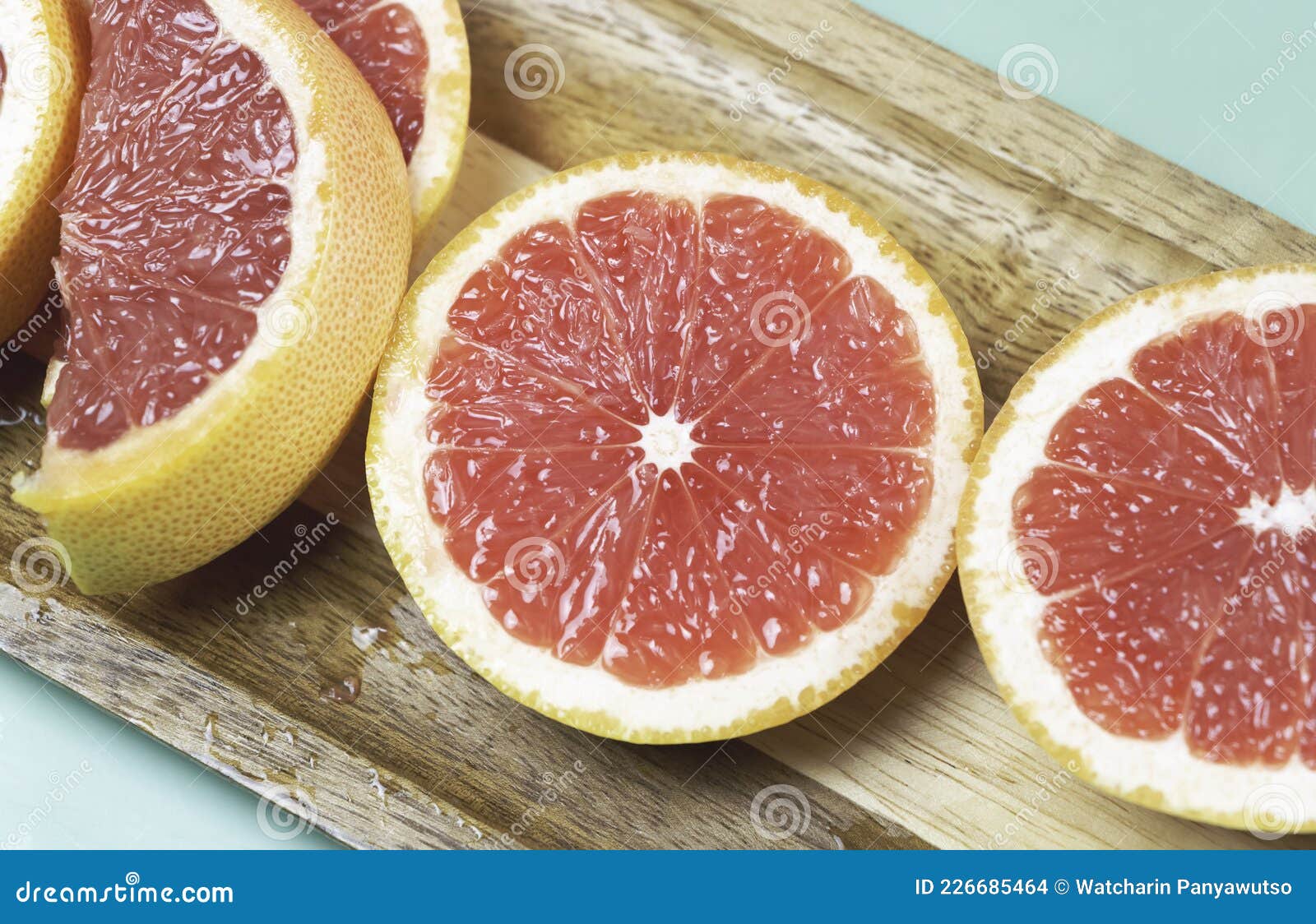 Sliced Grapefruit with Red Pulp Stock Photo - Image of dieting, single ...