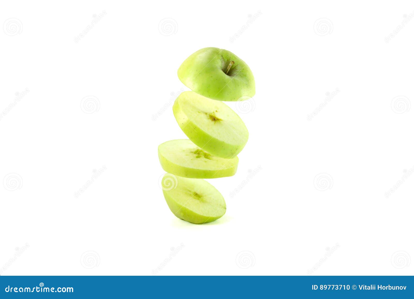 Sliced Green Apple Flying on White Background. Floating in the Stock ...