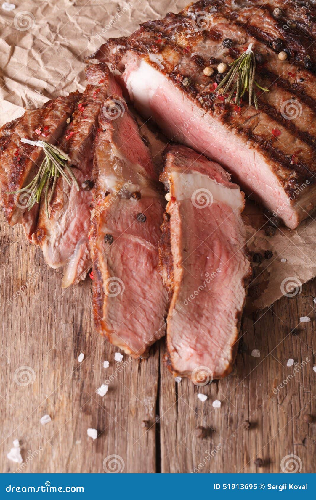 Sliced Grilled Beef Steak on a Wooden Vertical View Above Stock Image ...