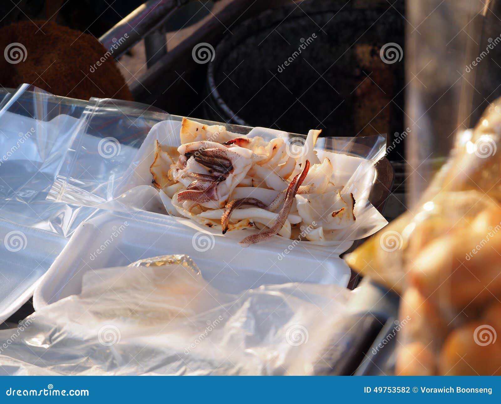 Sliced Grilled Sun Dried Squid in Foam Boxes Stock Photo - Image of ...