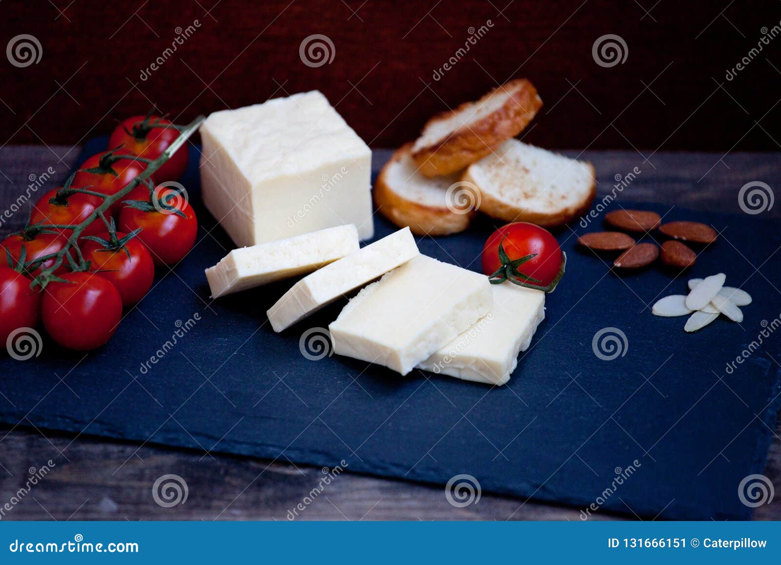 Halloumi Squeaky Cheese on a Slate Plate Stock Image - Image of grill ...