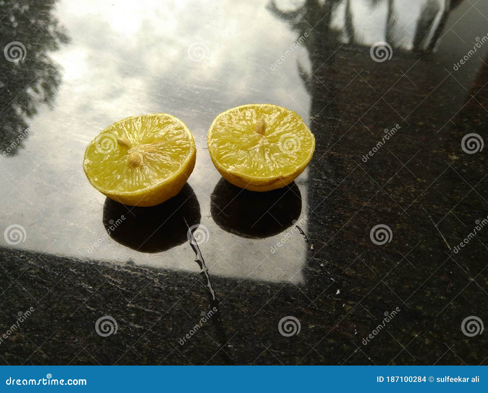 Sliced lemon piece stock photo. Image of fruit, piece - 187100284