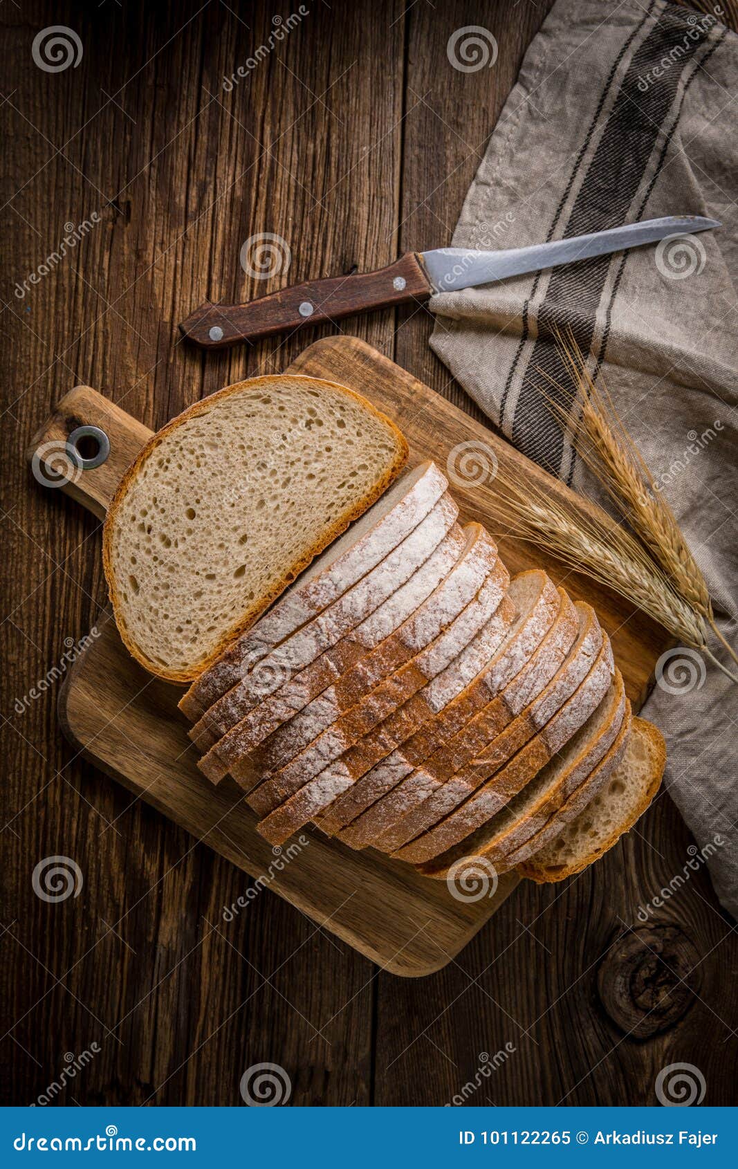 Sliced Loaf of Bread on a Chopping Board. Stock Image - Image of board ...