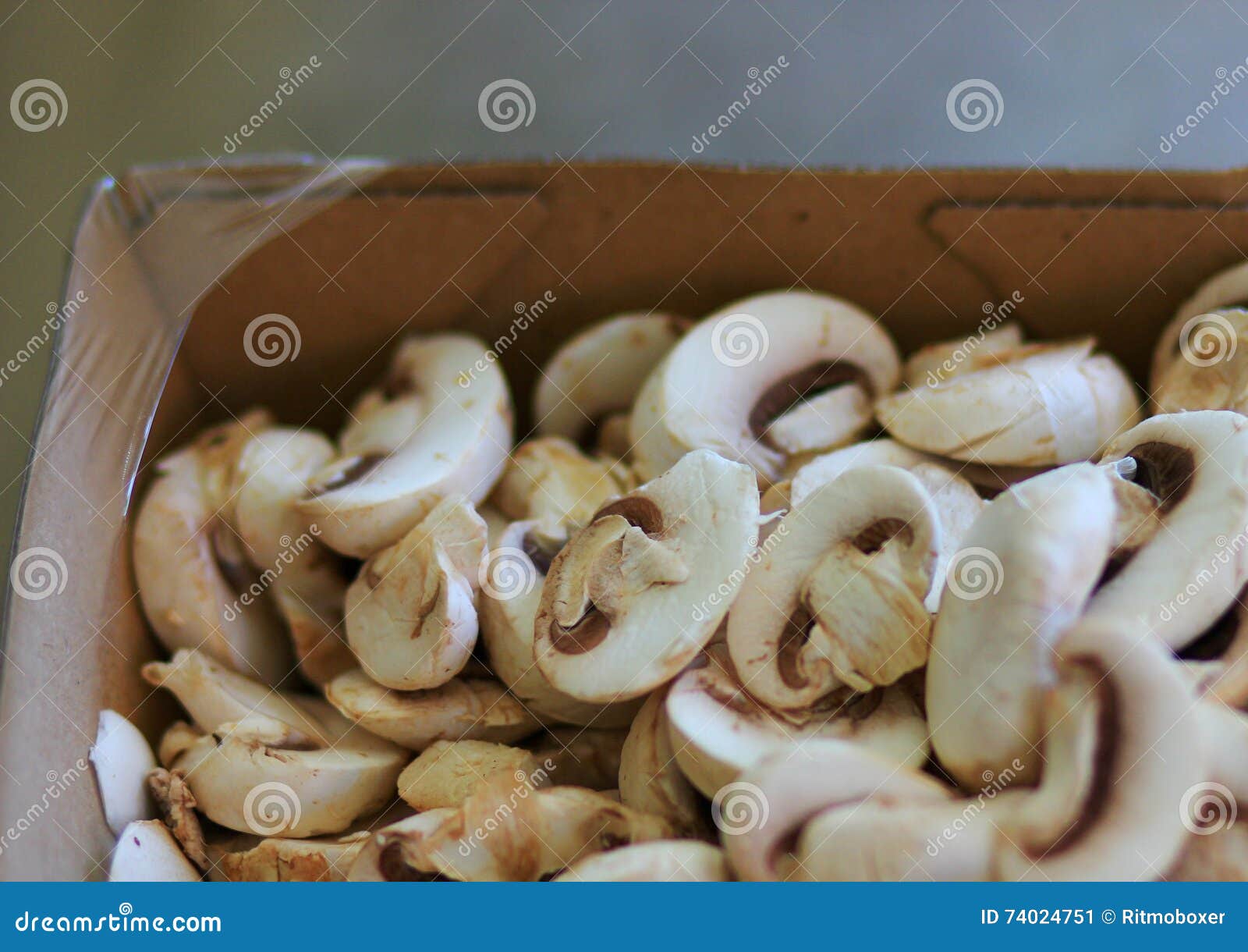 Sliced Mushrooms in a Cardboard Container Stock Image - Image of plate ...