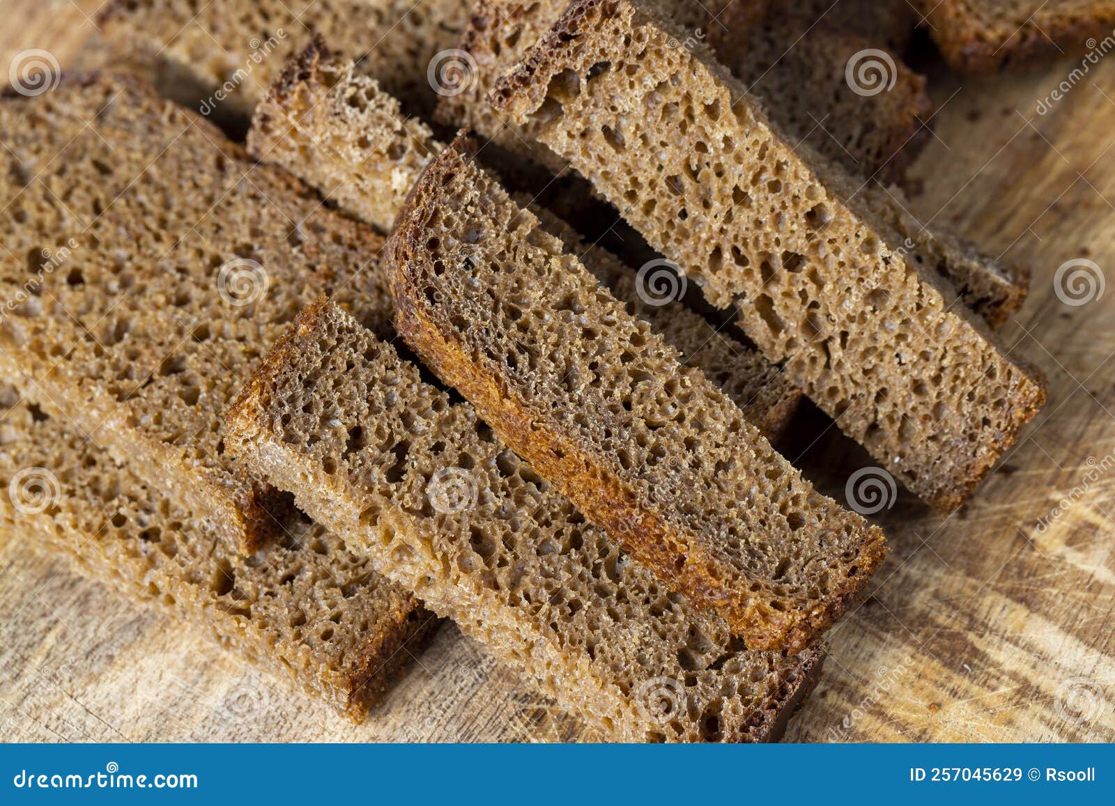Sliced Piece of Black Rye Bread on a Board Stock Image - Image of wheat ...