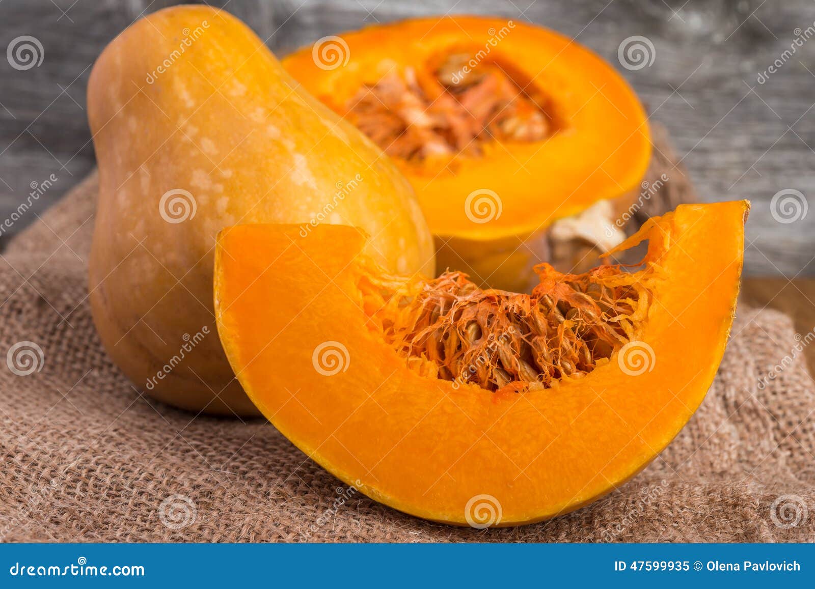 Sliced Pumpkin on Rustic Table and Burlap Stock Image - Image of yellow ...
