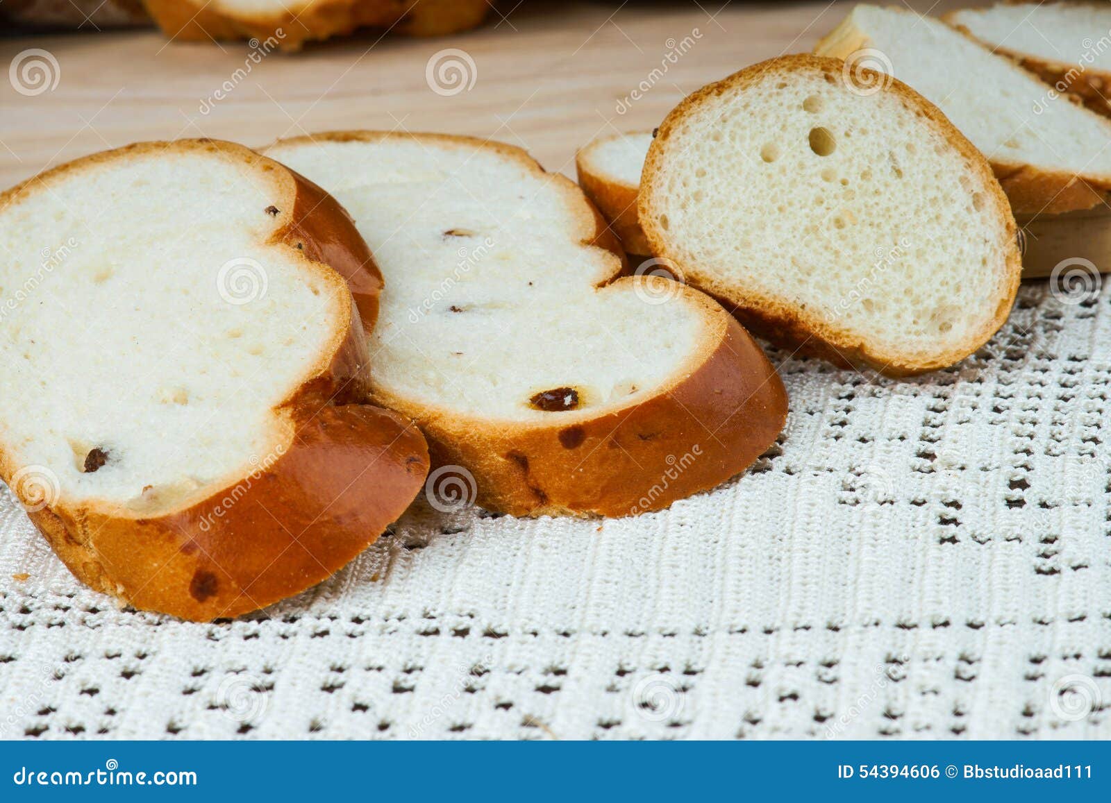 Sliced Raisin Bread on a Tablecloth Stock Photo - Image of grocery ...