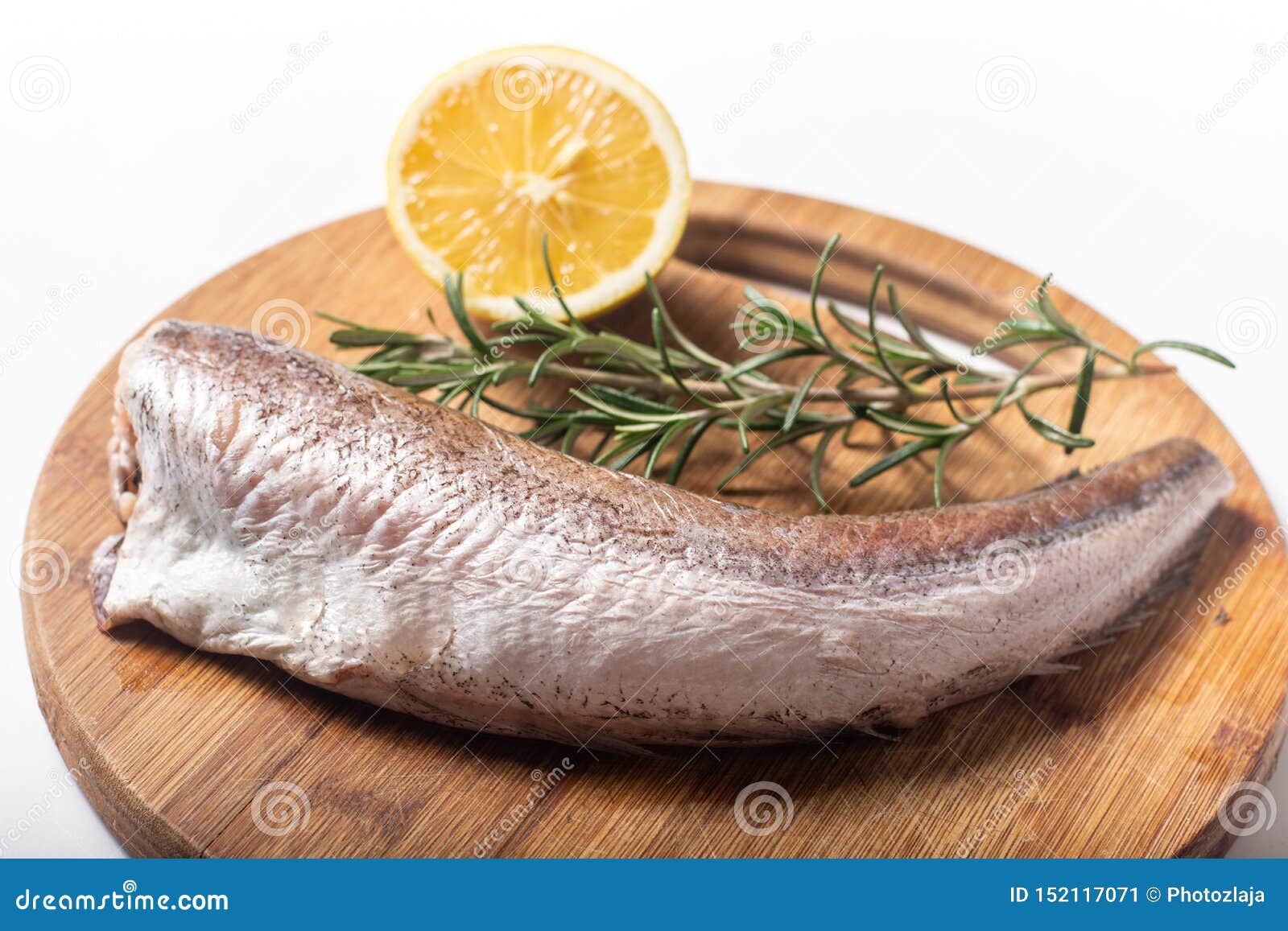 Sliced Raw Hake Fish with Lemon and Rosemary Stock Image - Image of ...