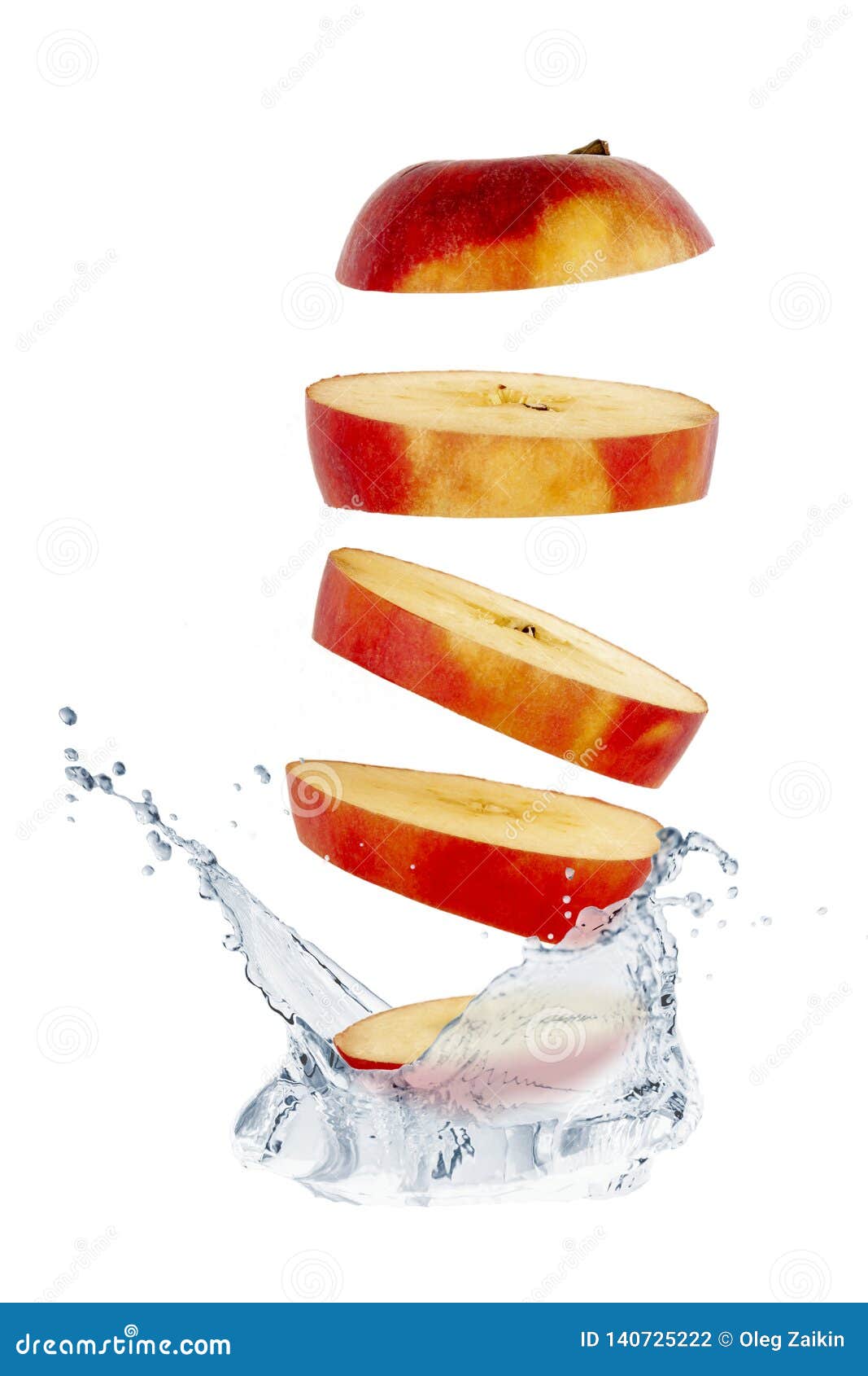 Sliced Red Apple Falls into the Water with Sprays Stock Photo - Image ...