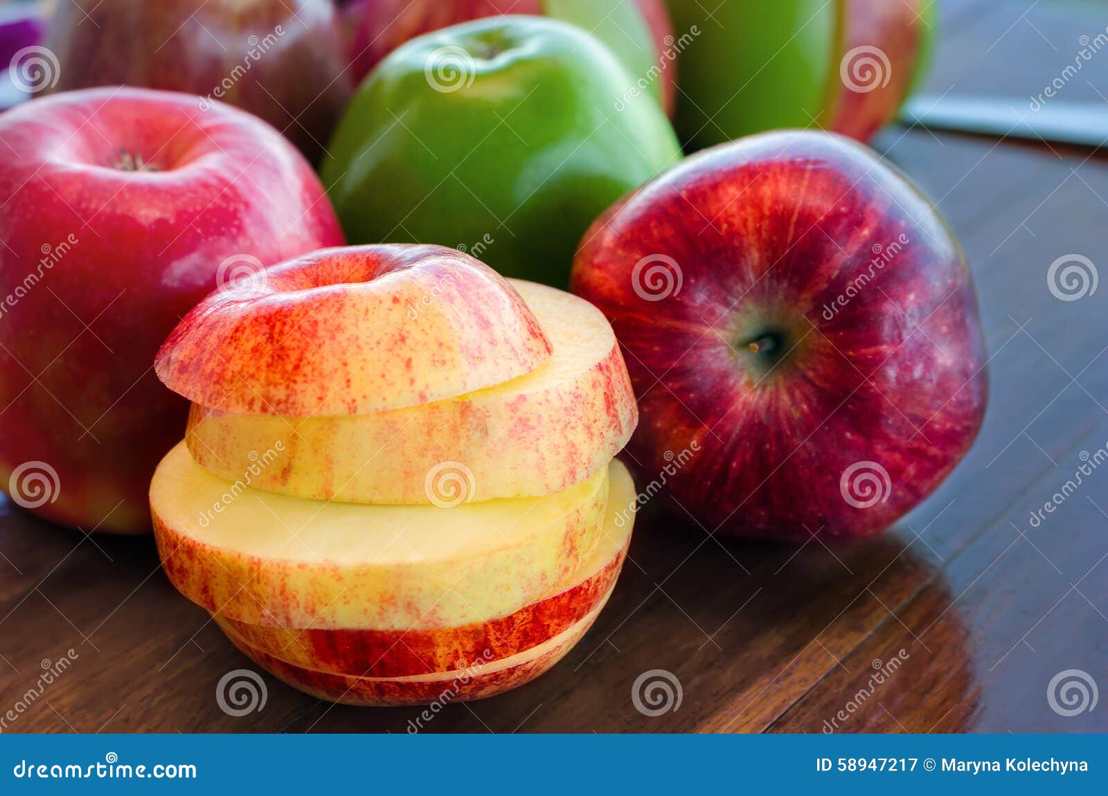 Sliced red apple stock image. Image of cheerful, table - 58947217