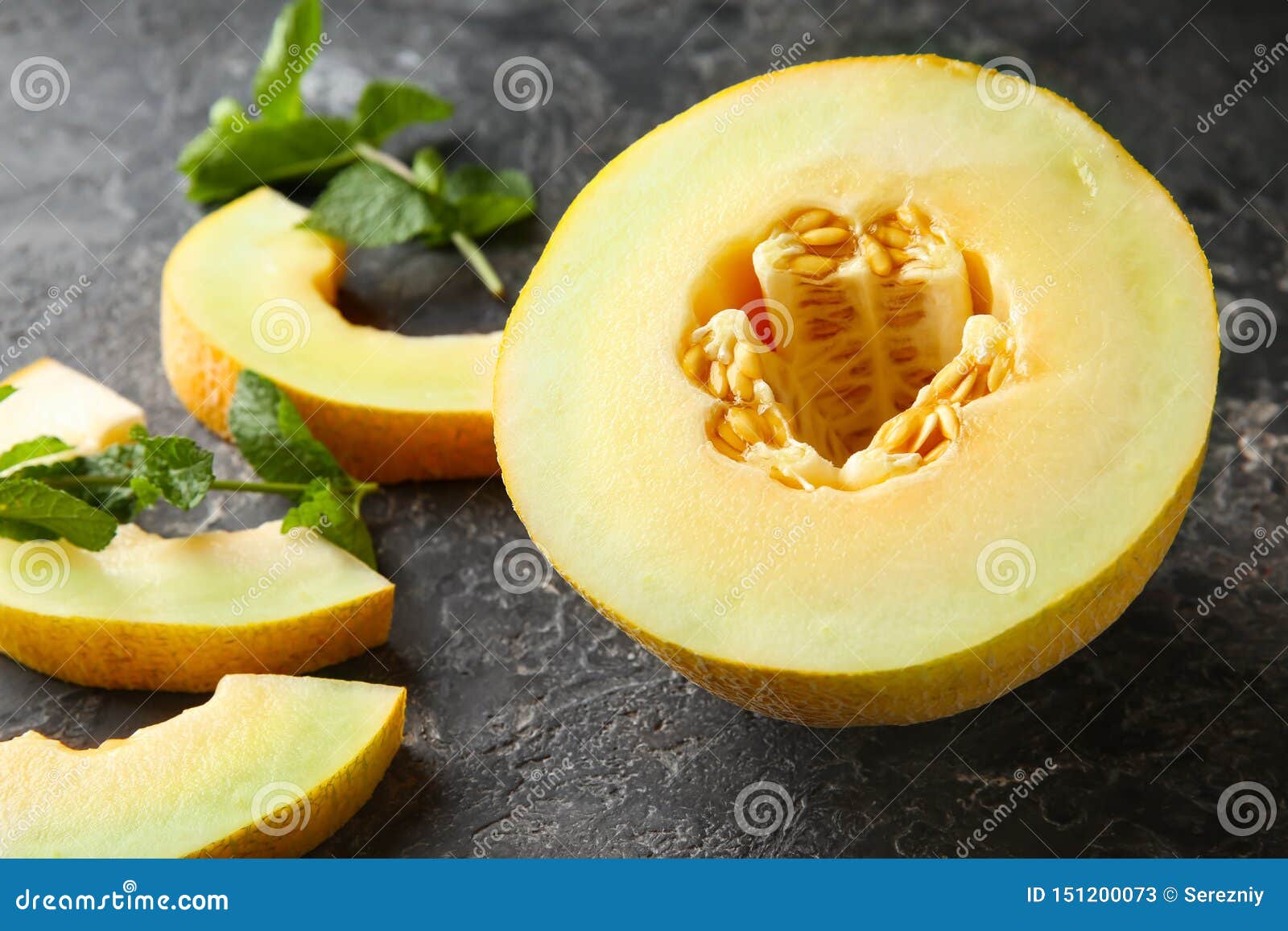 Sliced Ripe Melon on Dark Textured Table Stock Image - Image of piece ...