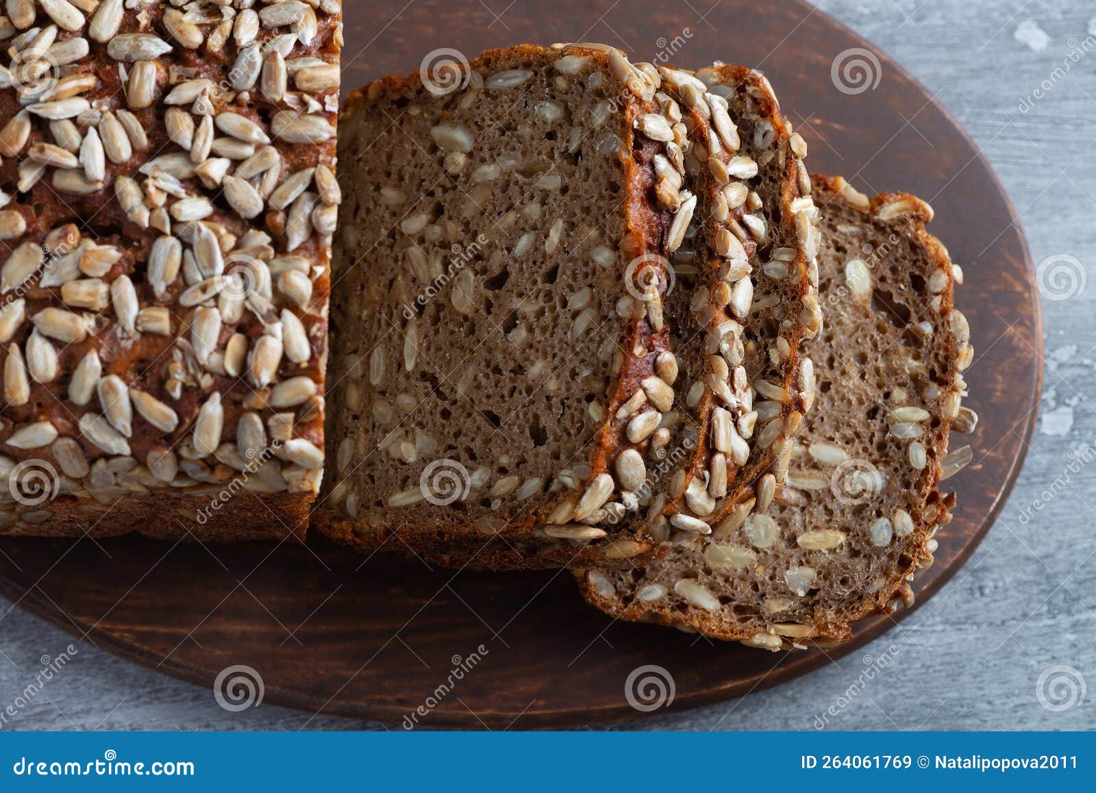 Sliced Rye Bread on Cutting Board. Whole Grain Rye Bread with Seeds ...