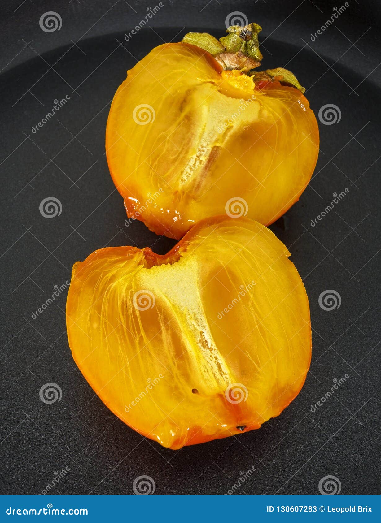 Sliced sharon fruit stock image. Image of kaki, sharon - 130607283