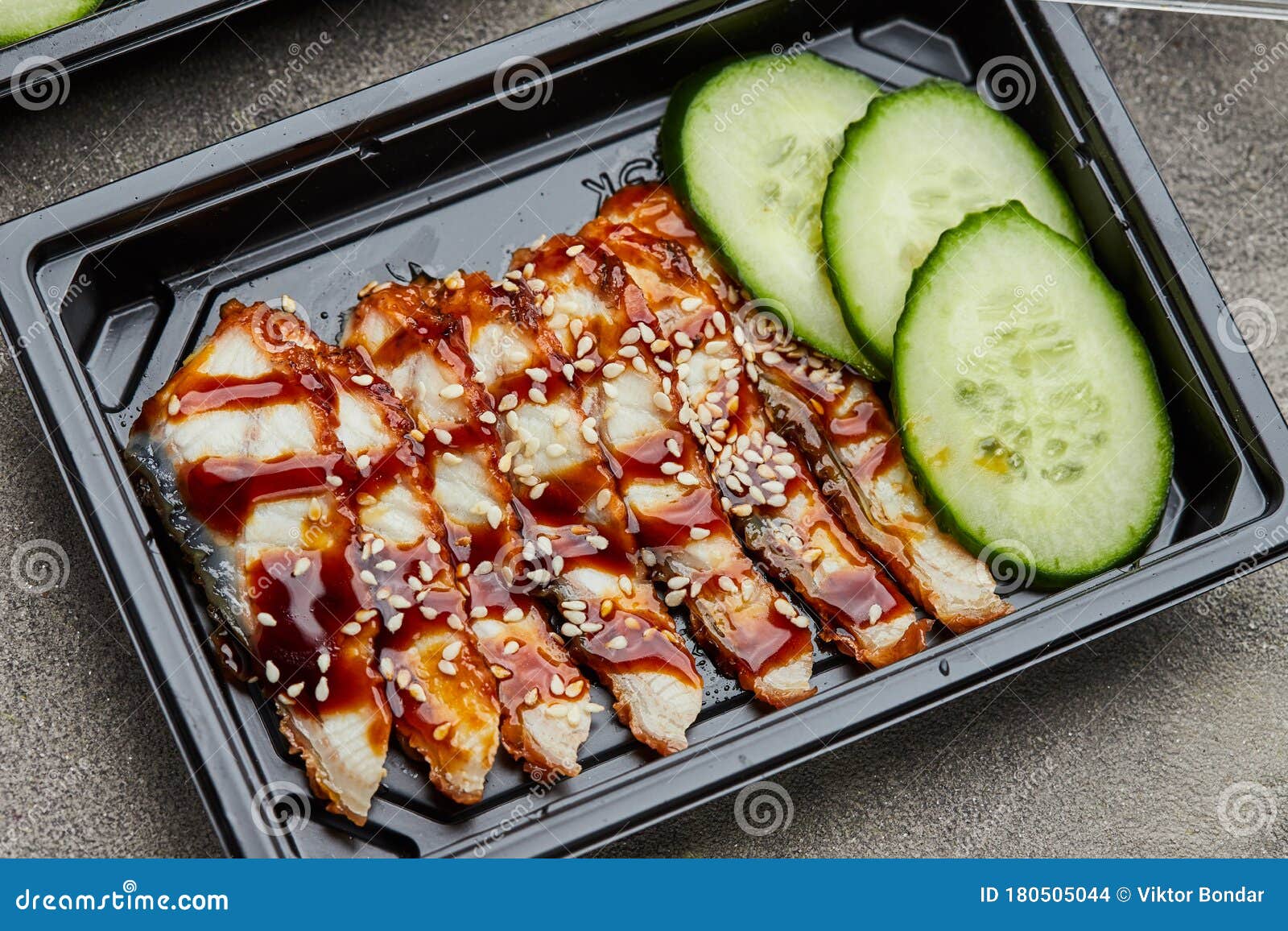 Sliced Smoked Eel Fillet with Cucumber in Plastic Box Ready for ...