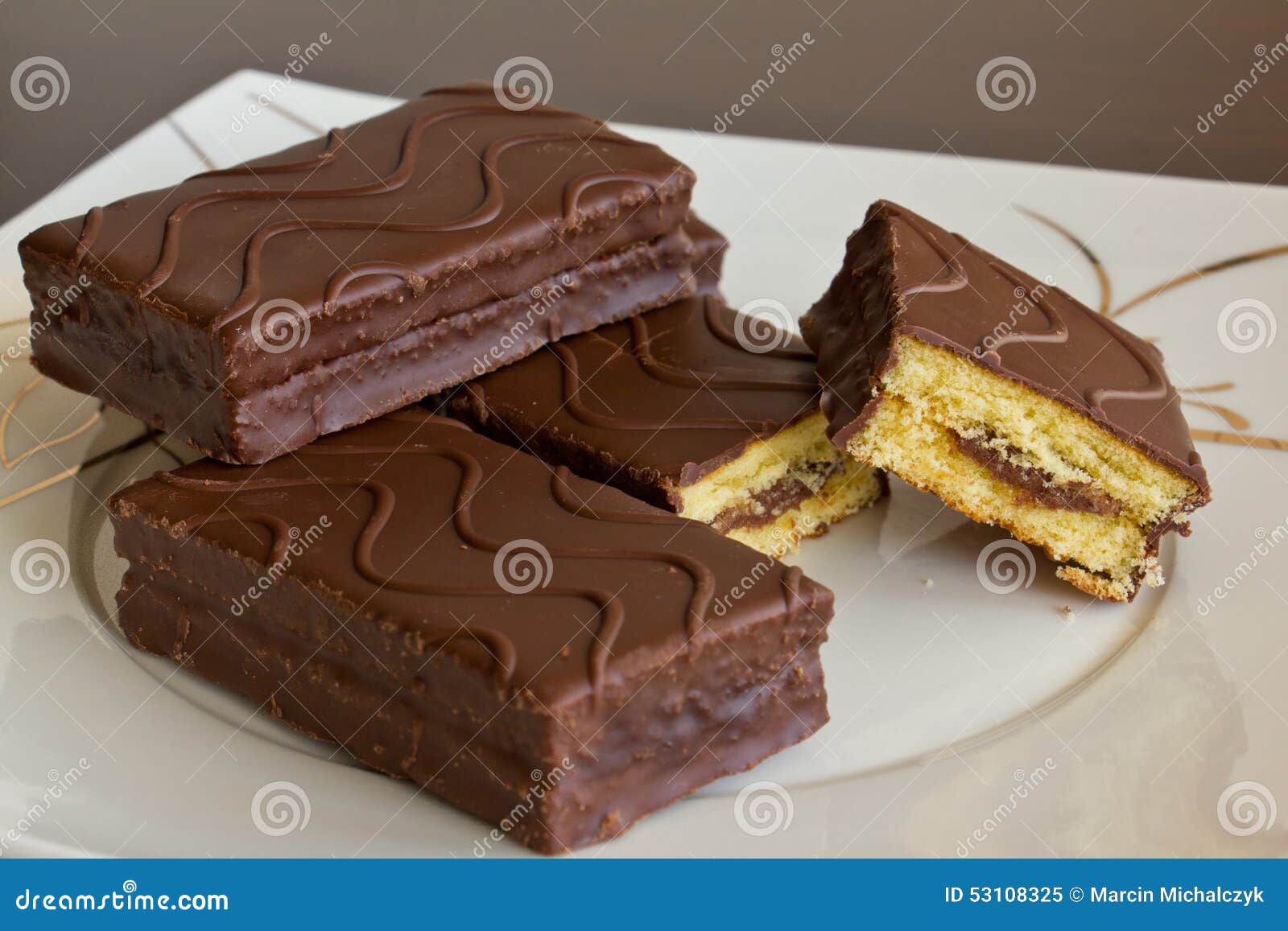 Sliced Sponge Cake in Chocolate Stock Image - Image of food, pieces ...