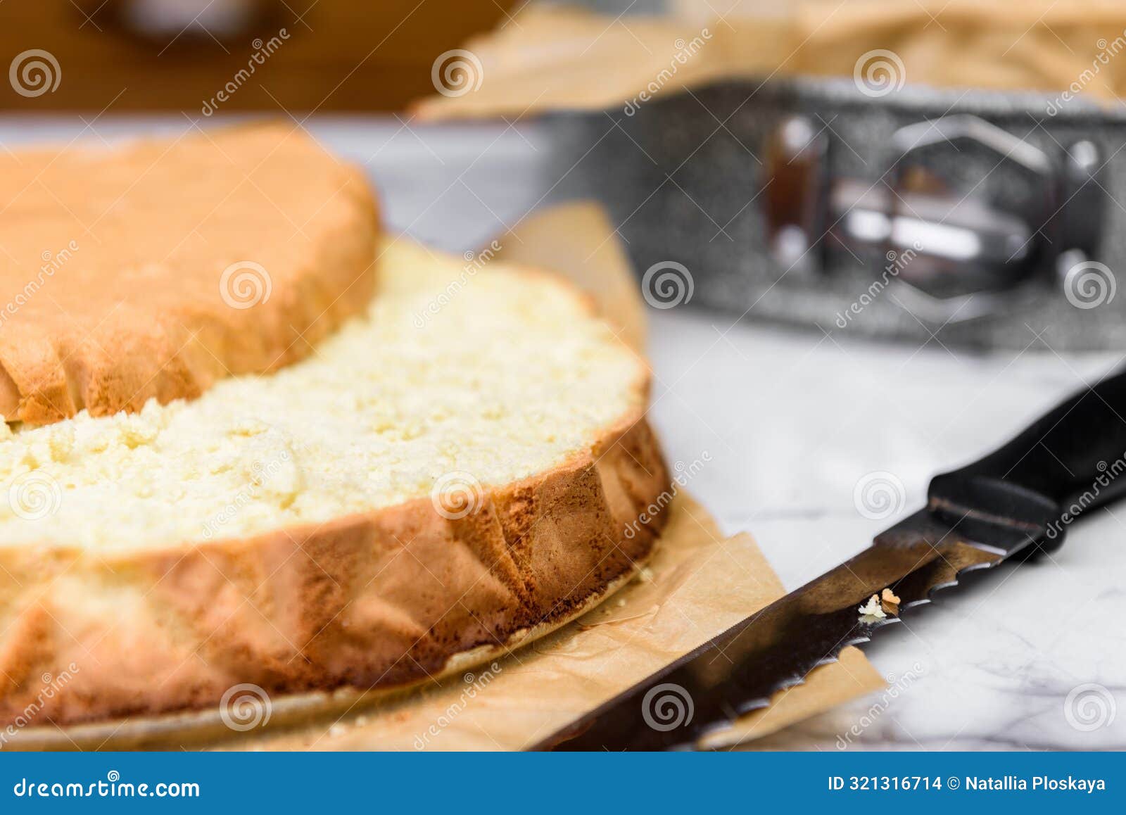 Sliced Sponge Cake with Knife for Making Cake on White Table. Stock ...