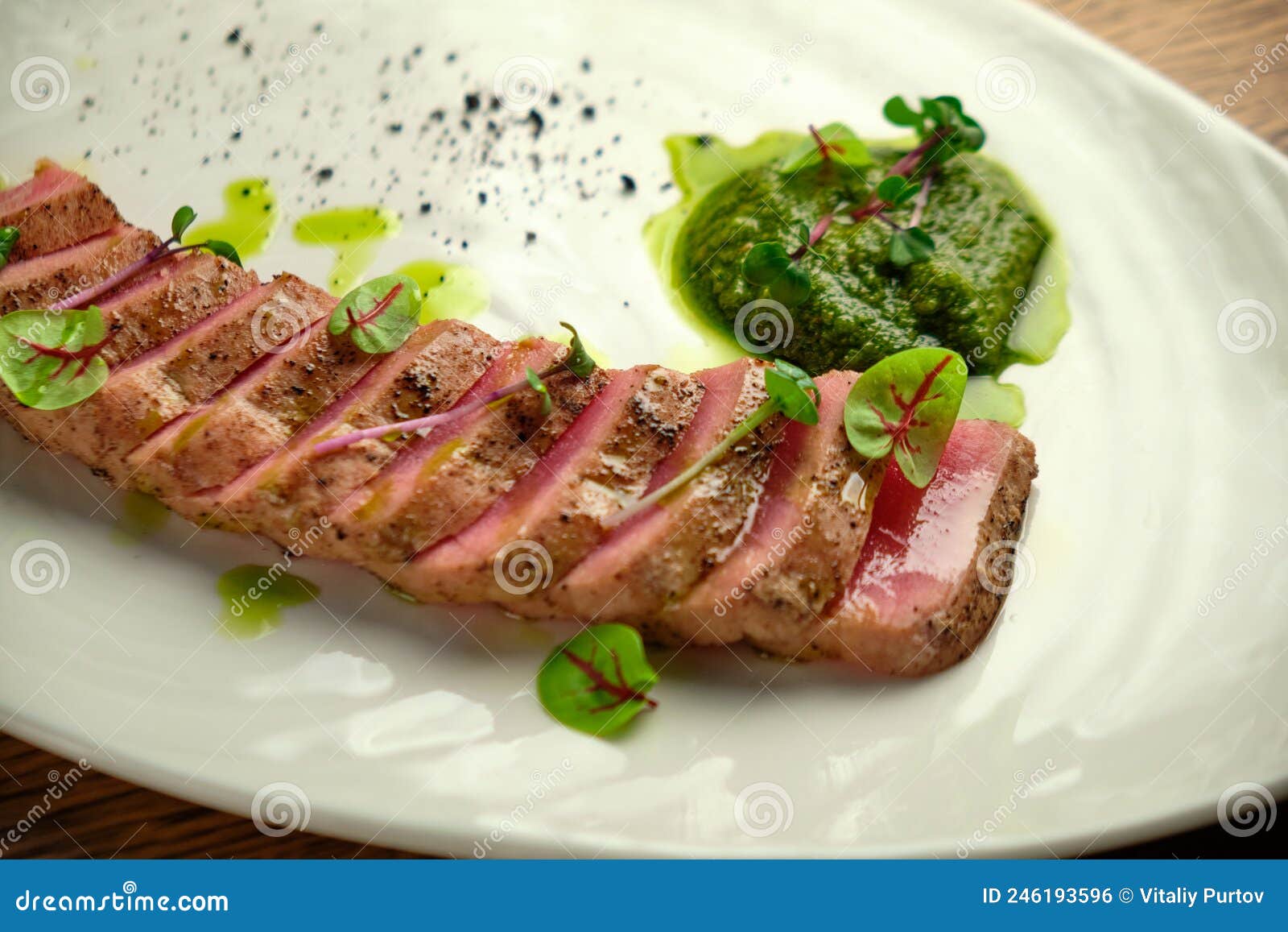 Sliced steak with blood stock photo. Image of fillet - 246193596