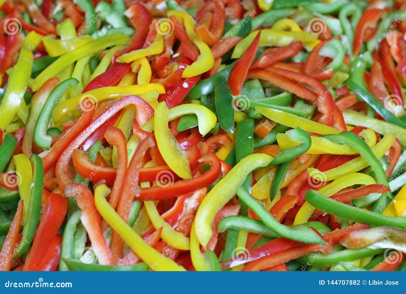 Sliced Three Color Capsicum Stock Photo - Image of group, vegetarian ...
