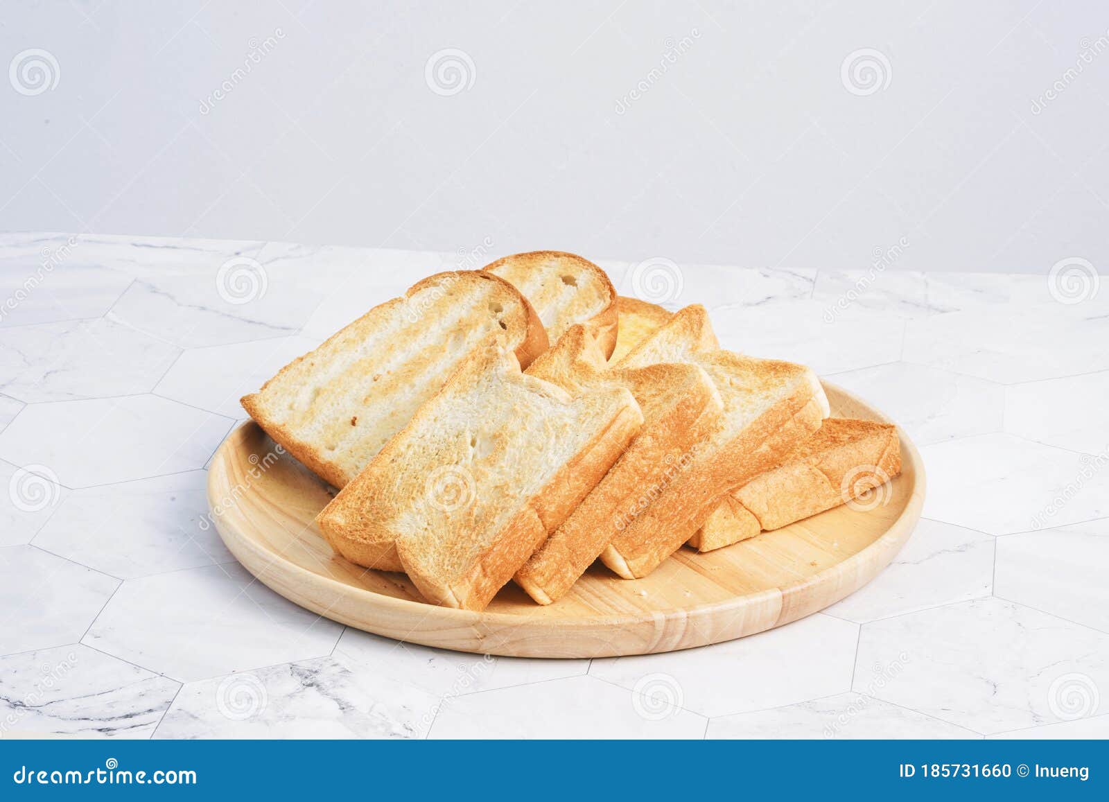 Sliced Toast on a Wooden Plate. Stock Photo - Image of table, closeup ...