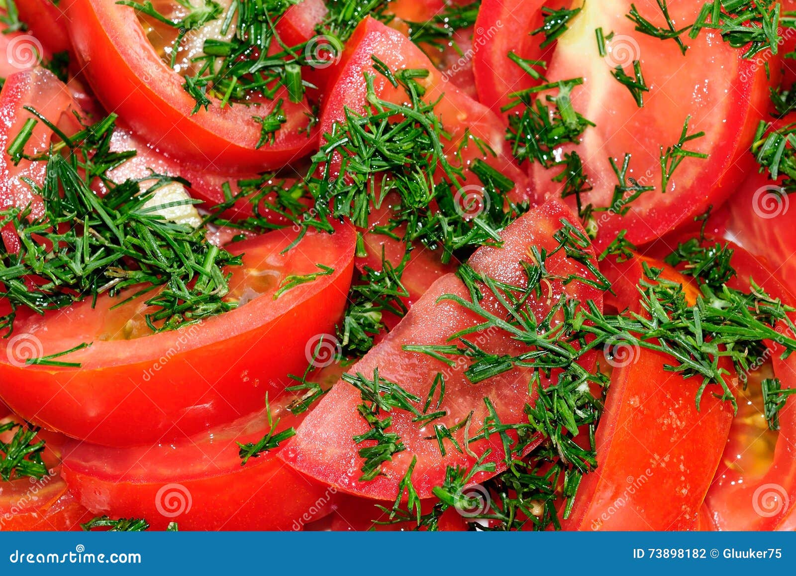 Sliced tomato with dill stock photo. Image of health - 73898182