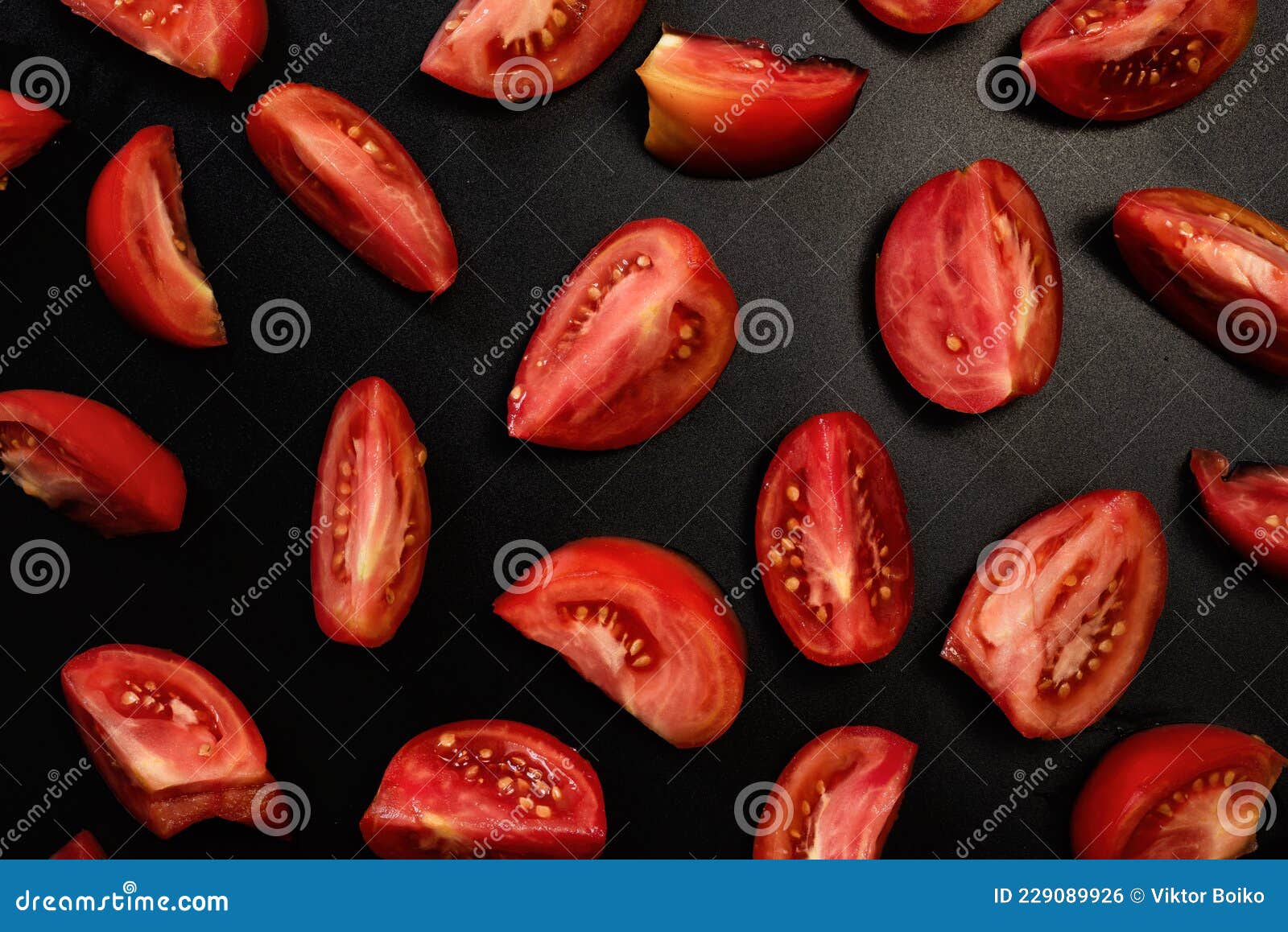 Sliced Tomato Slices for Background and Design on a Black Backdrop ...