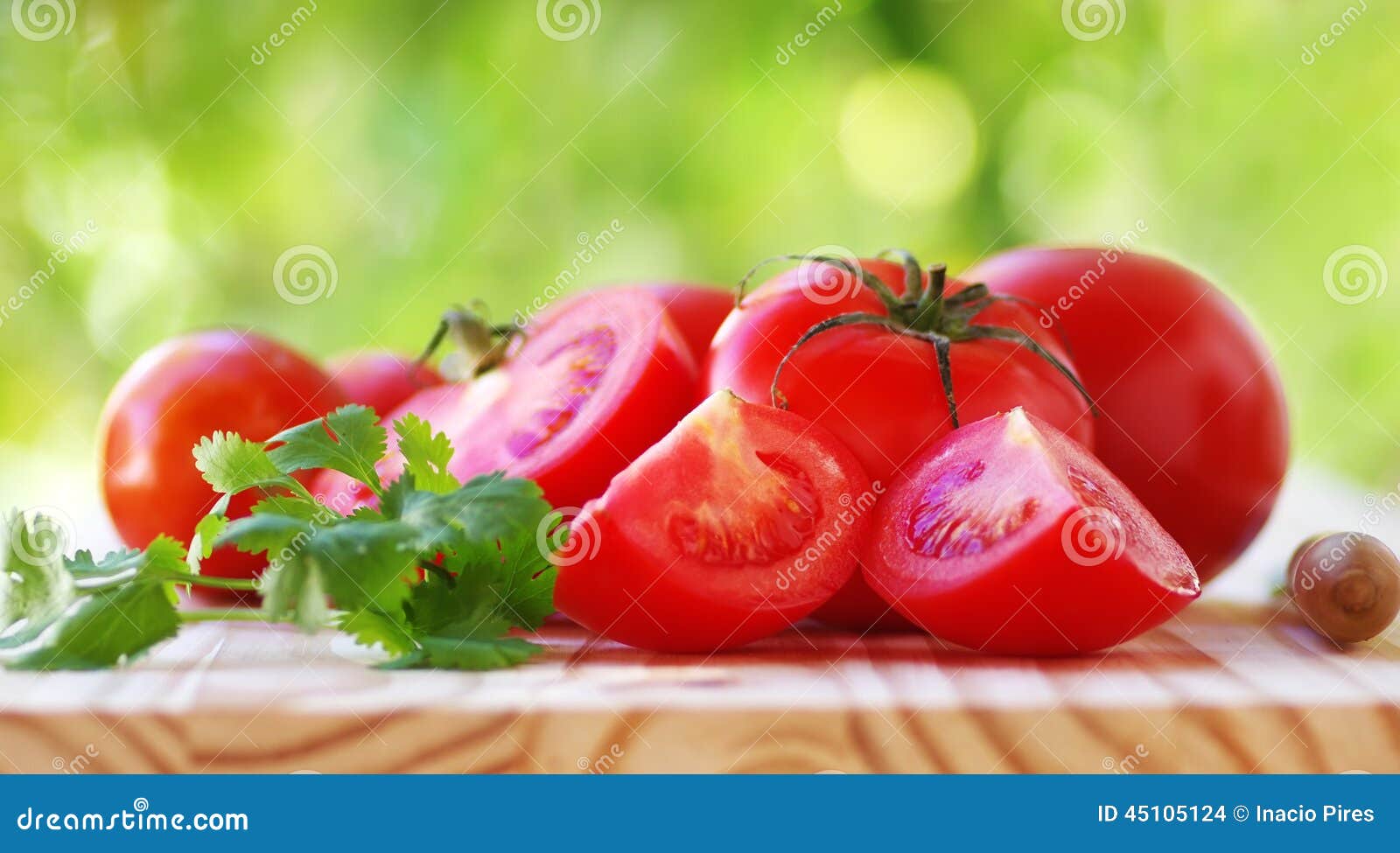 Sliced Tomatoes and Cilantro Stock Photo - Image of isolated, juicy ...