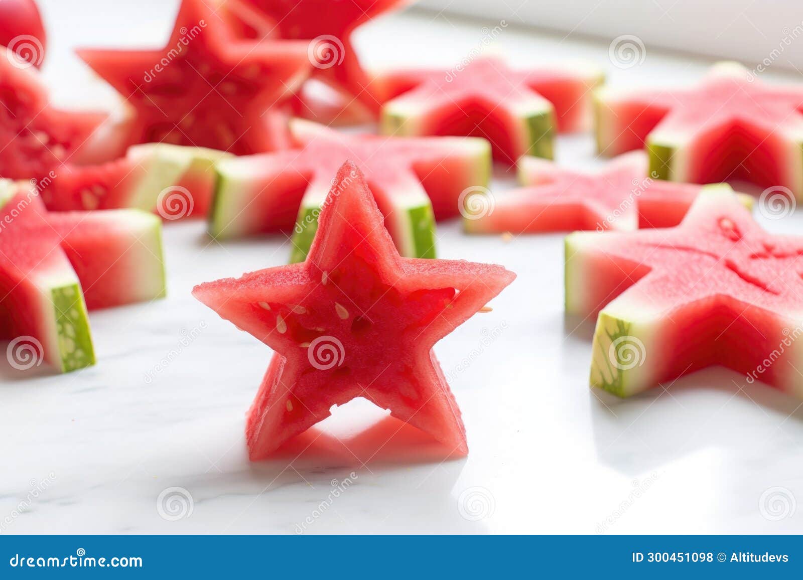 Sliced Watermelon in the Shape of Stars on a Bright White Table Stock ...