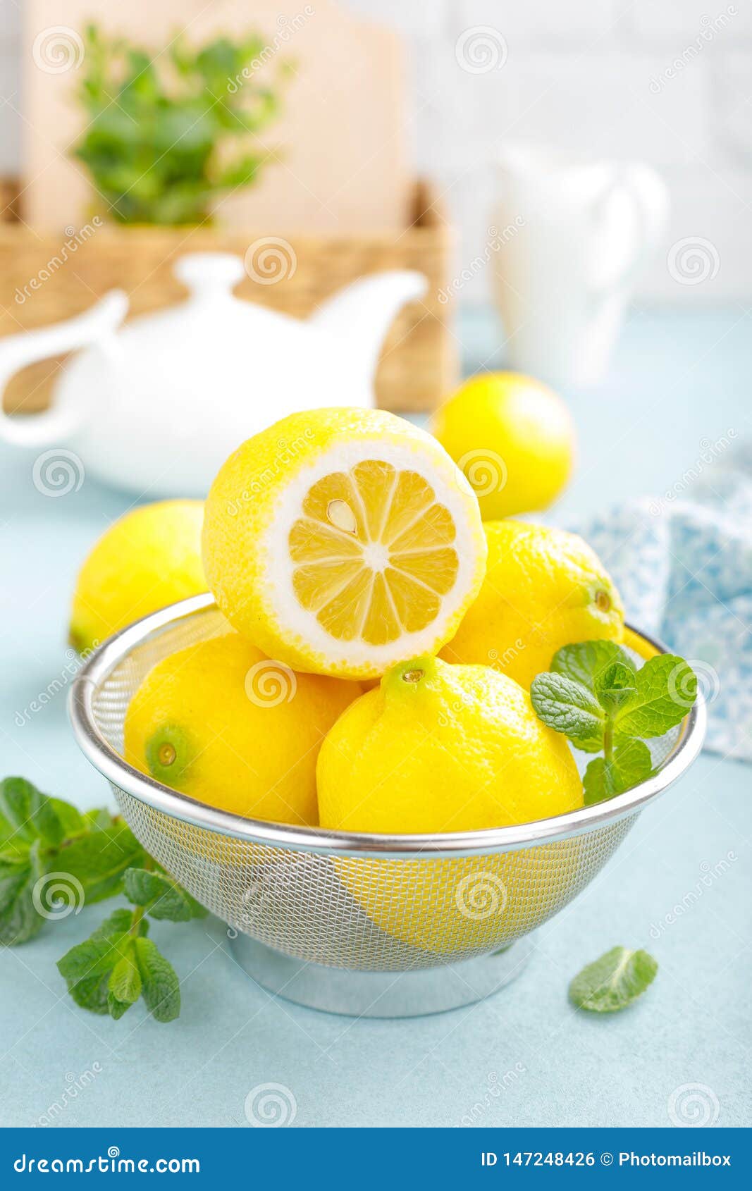 Sliced and Whole Lemons with Mint Stock Photo - Image of lemons, exotic ...