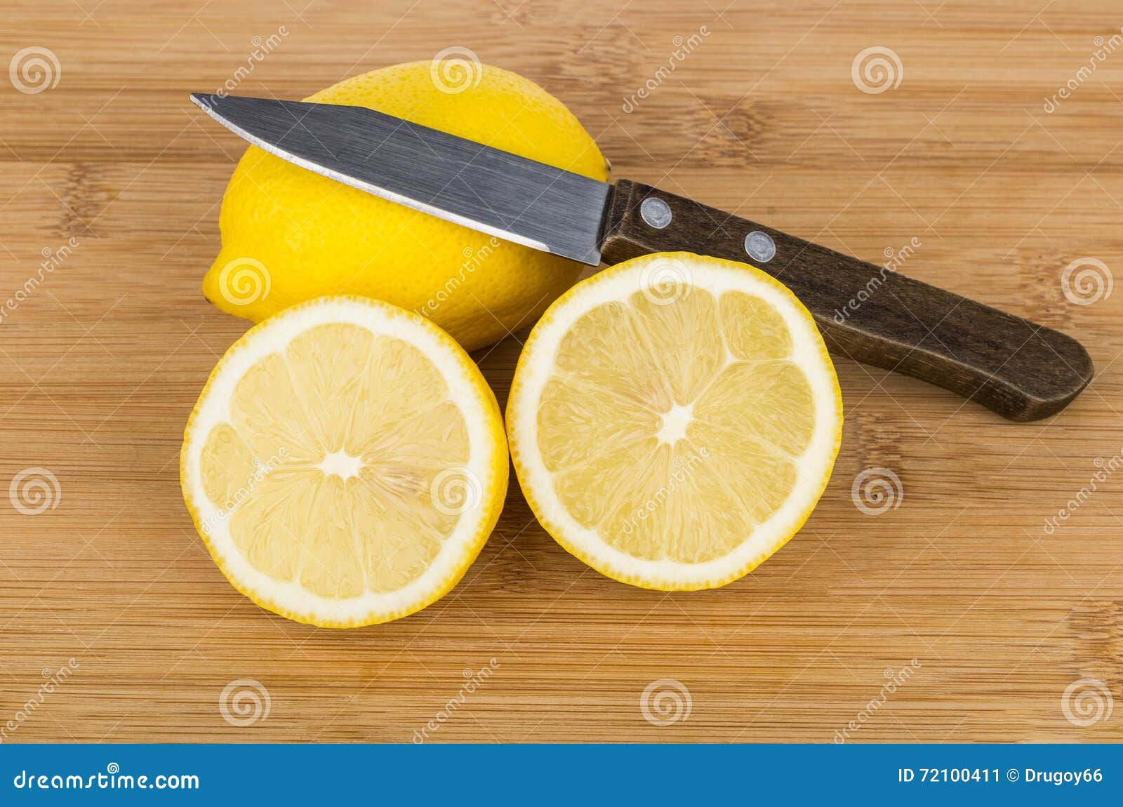 Sliced Yellow Lemon and Knife on Table Stock Image - Image of sour ...
