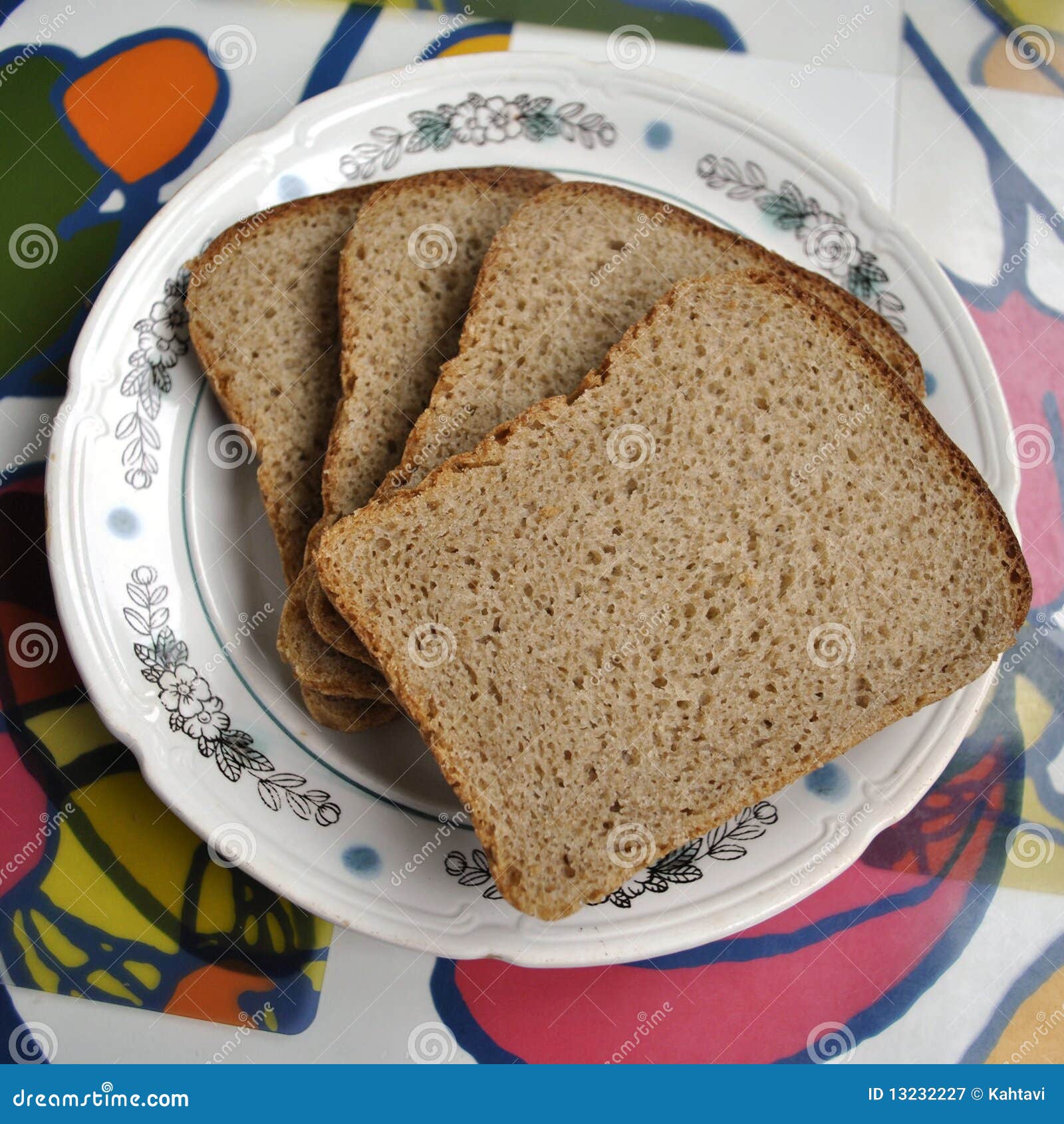 Slices of bread on a plate stock image. Image of slice - 13232227