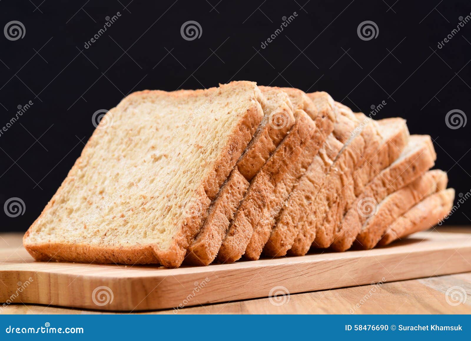 Slices Bread on Wooden Table Stock Photo - Image of food, bread: 58476690