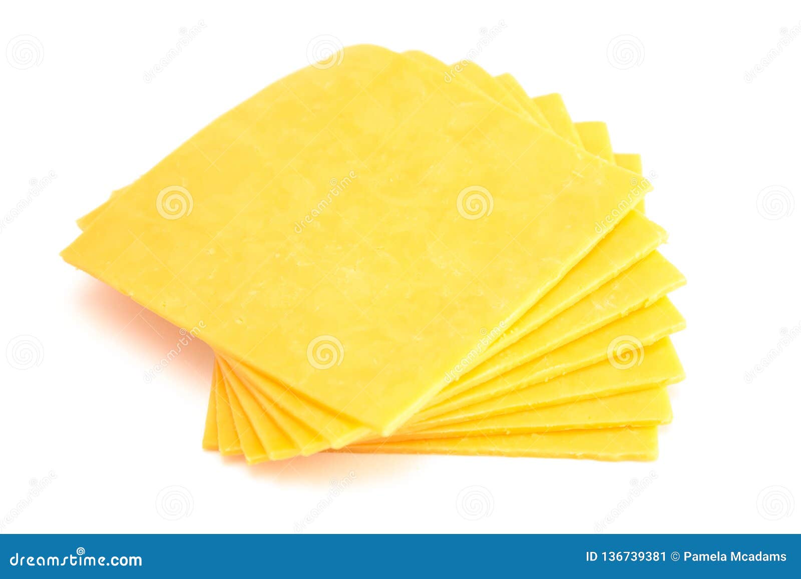 Slices of Cheddar Cheese on a White Background Stock Image - Image of ...
