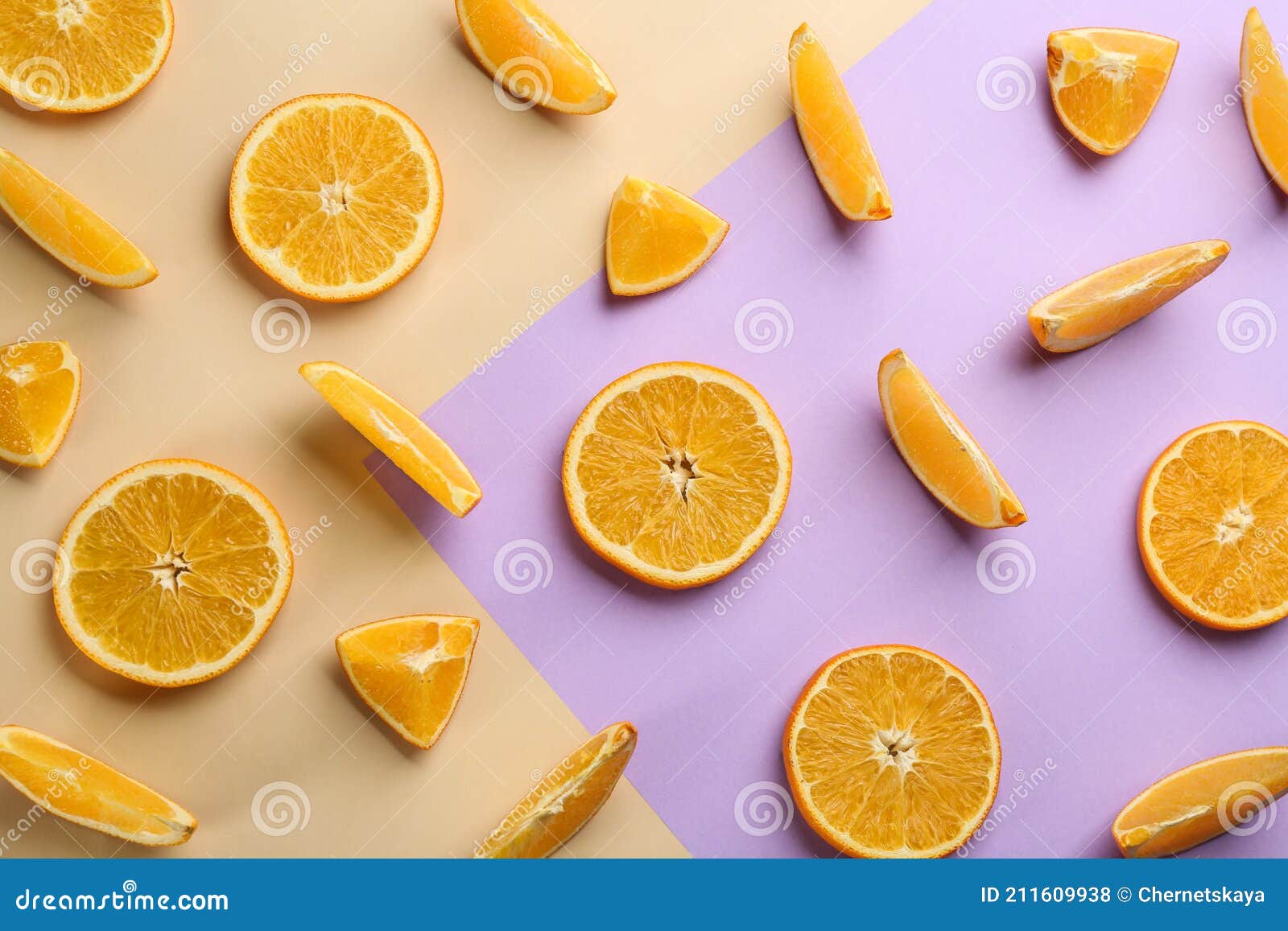 Slices of Delicious Oranges on Color Background, Flat Lay Stock Photo ...