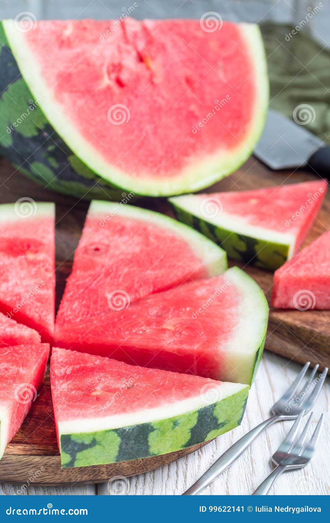 Slices of Fresh Seedless Watermelon Cut into Triangle Shape on Wooden ...