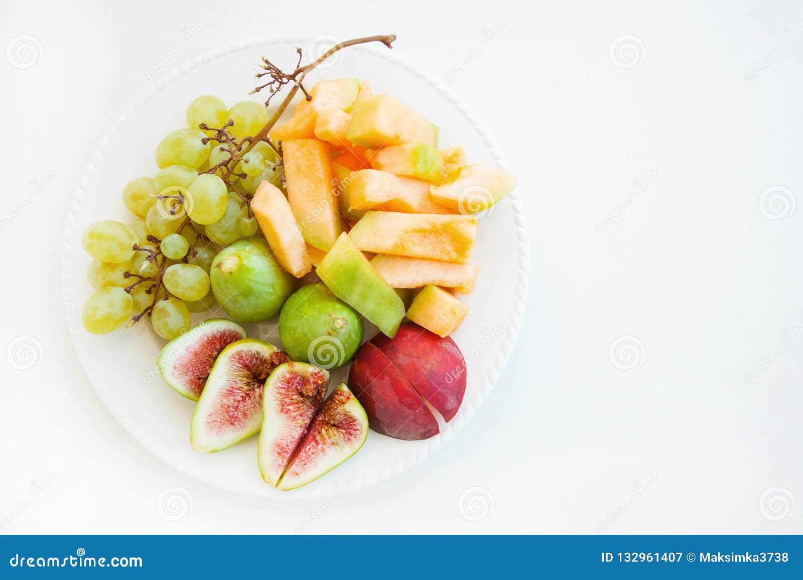 Slices of Green Figs of Melon and Grapes. Stock Image - Image of ...