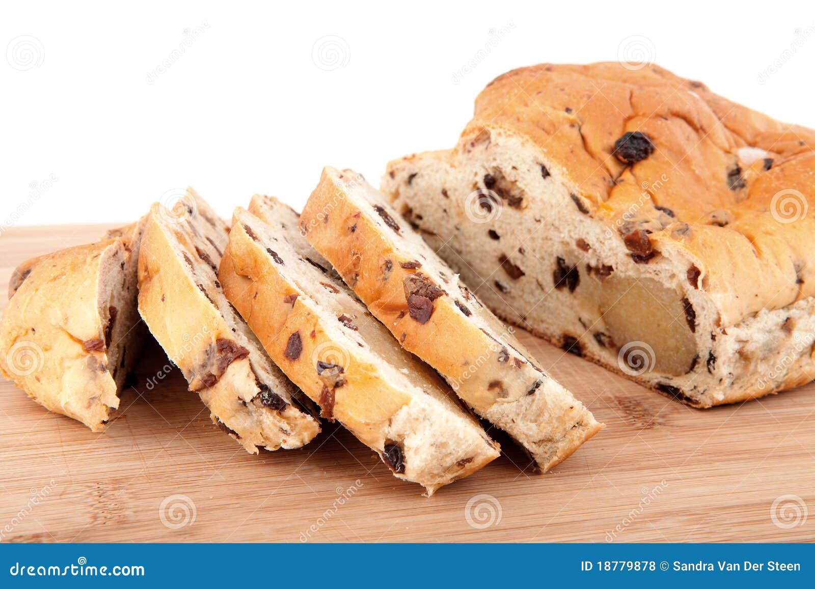 Slices of Raising Bread on Wooden Cutting Board Stock Photo - Image of ...