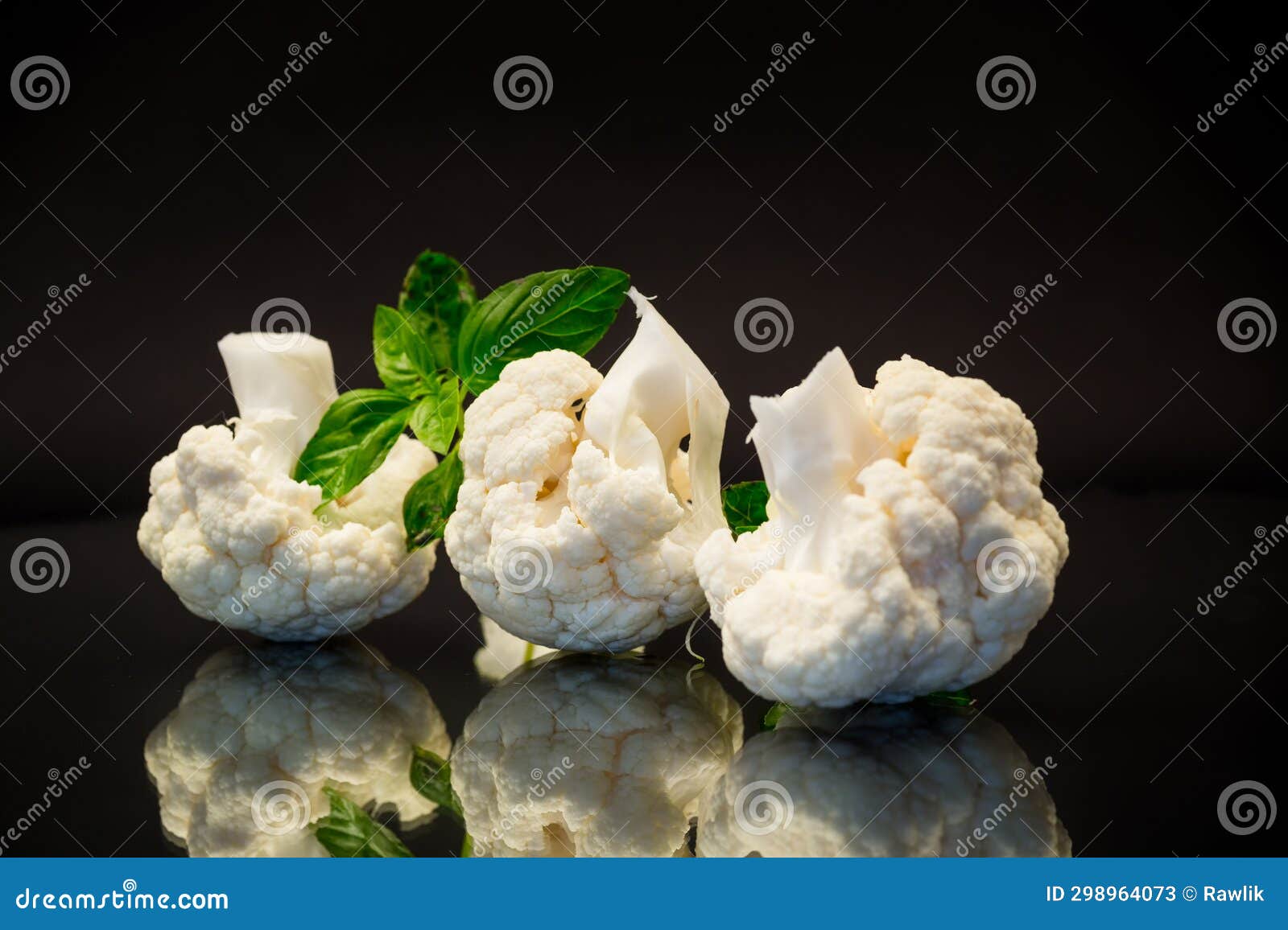 Slices of Raw Small Raw Cauliflower on Black Background Stock Image ...