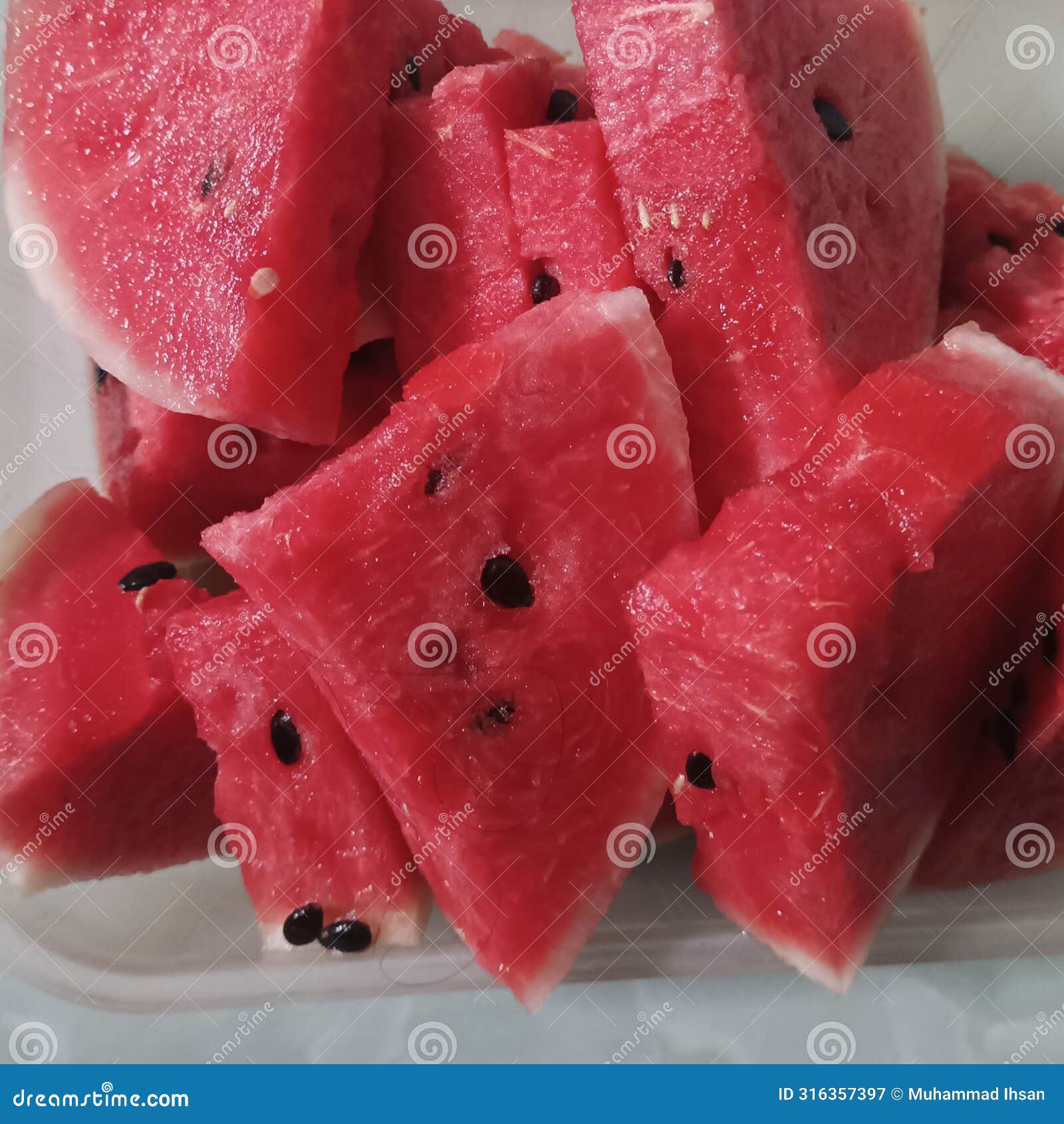 Slices of Red Watermelon Placed in a Plastic Cup Stock Image - Image of ...