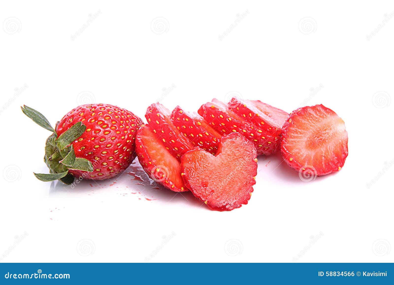 Slices of Strawberries with a Single Strawberry Stock Photo - Image of ...