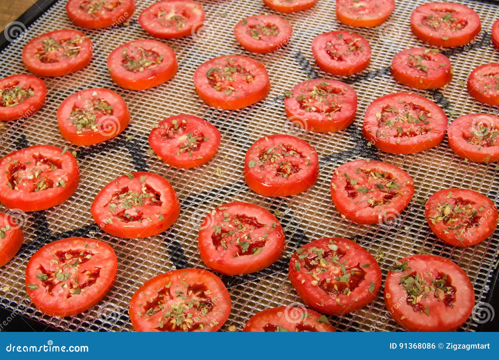 Slices of Tomatoes on Drying Rack Stock Photo - Image of organic ...