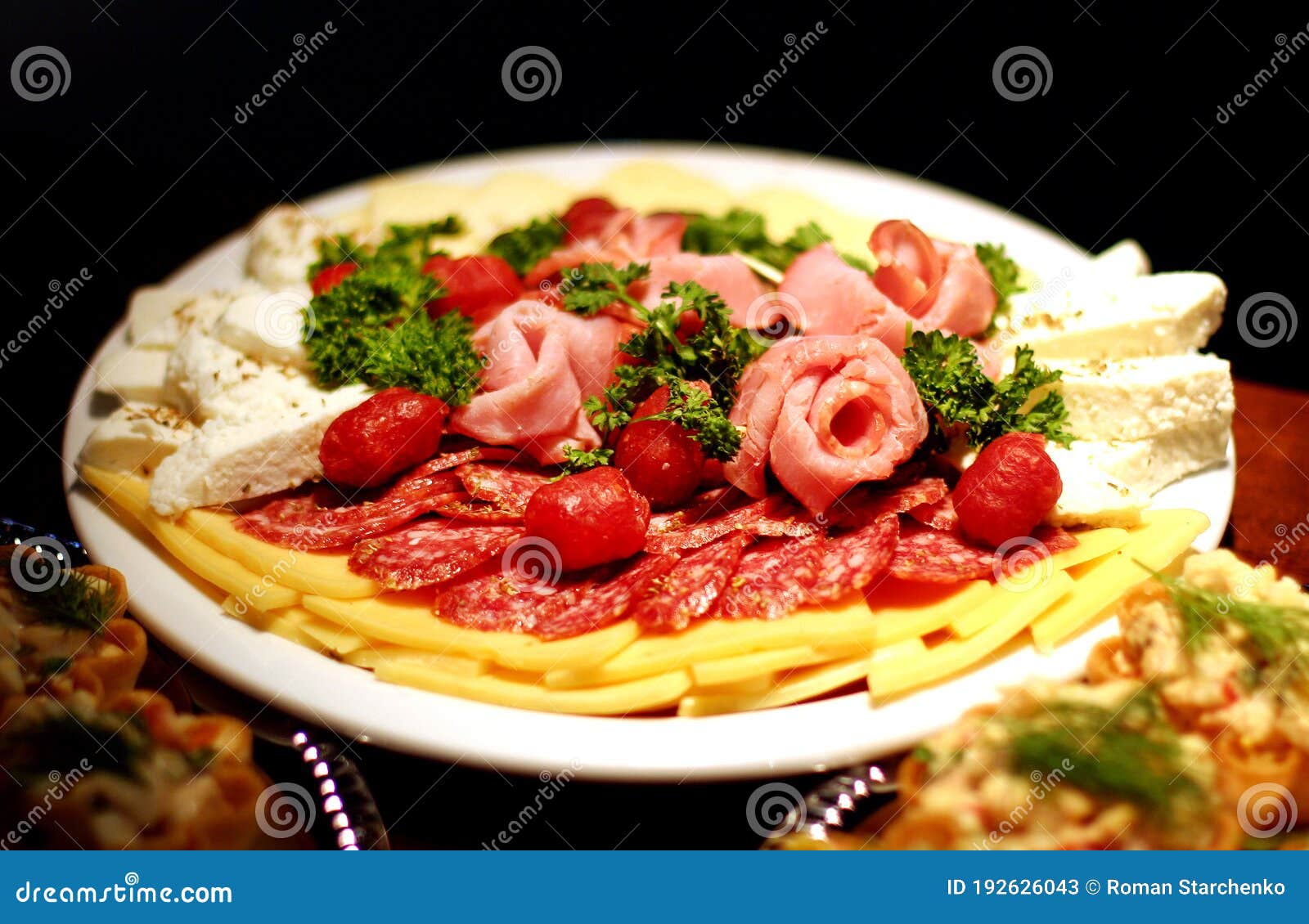Slices on a White Plate. Beautiful Serving of Appetizers Stock Image ...