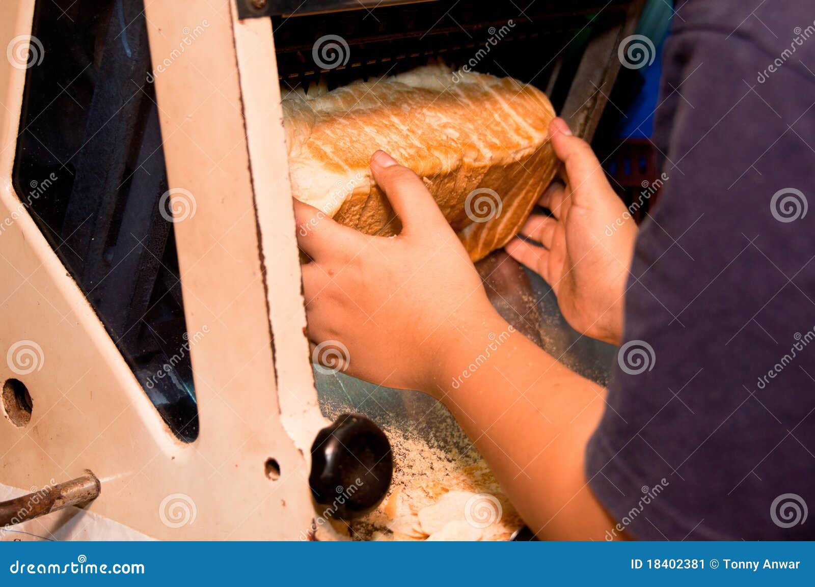 Slicing Bread stock image. Image of slicer, bakery, baking - 18402381