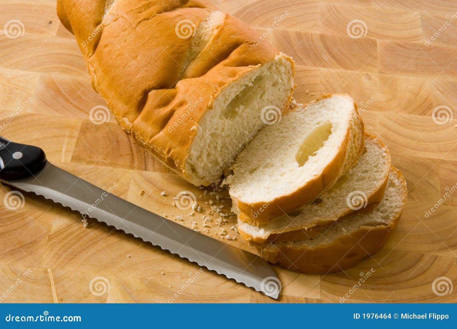 Slicing bread stock photo. Image of french, knife, cutting - 1976464
