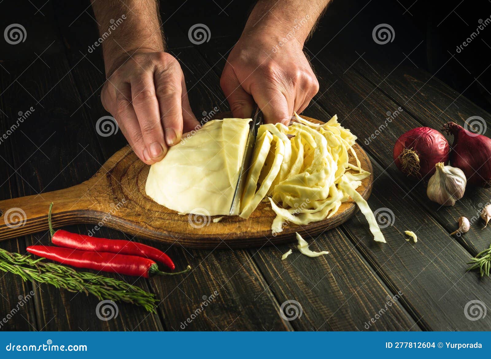 Slicing Cabbage with a Knife in the Hands of a Cook for a Vegetarian ...
