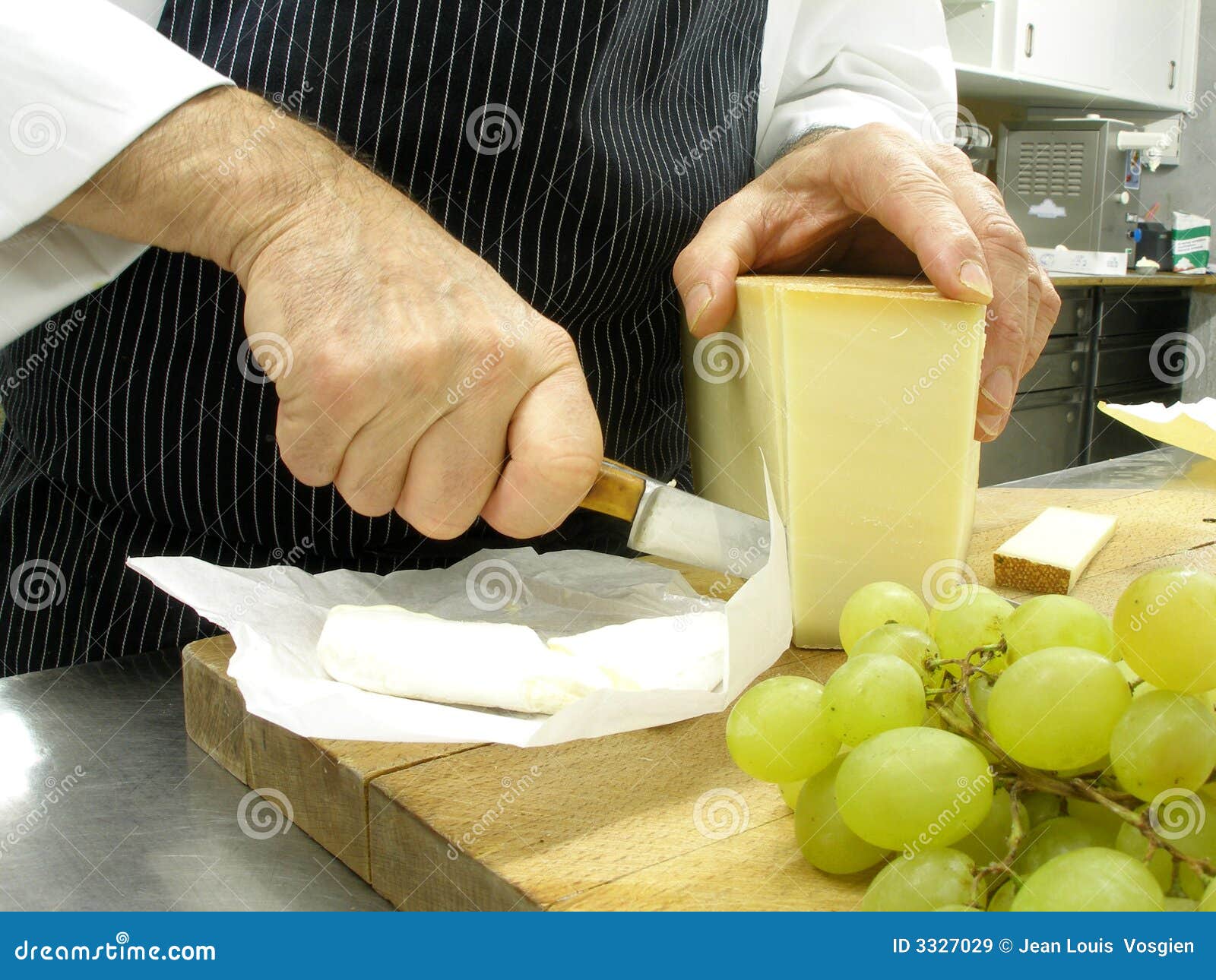 Slicing cheese stock image. Image of preparing, food, restaurant - 3327029